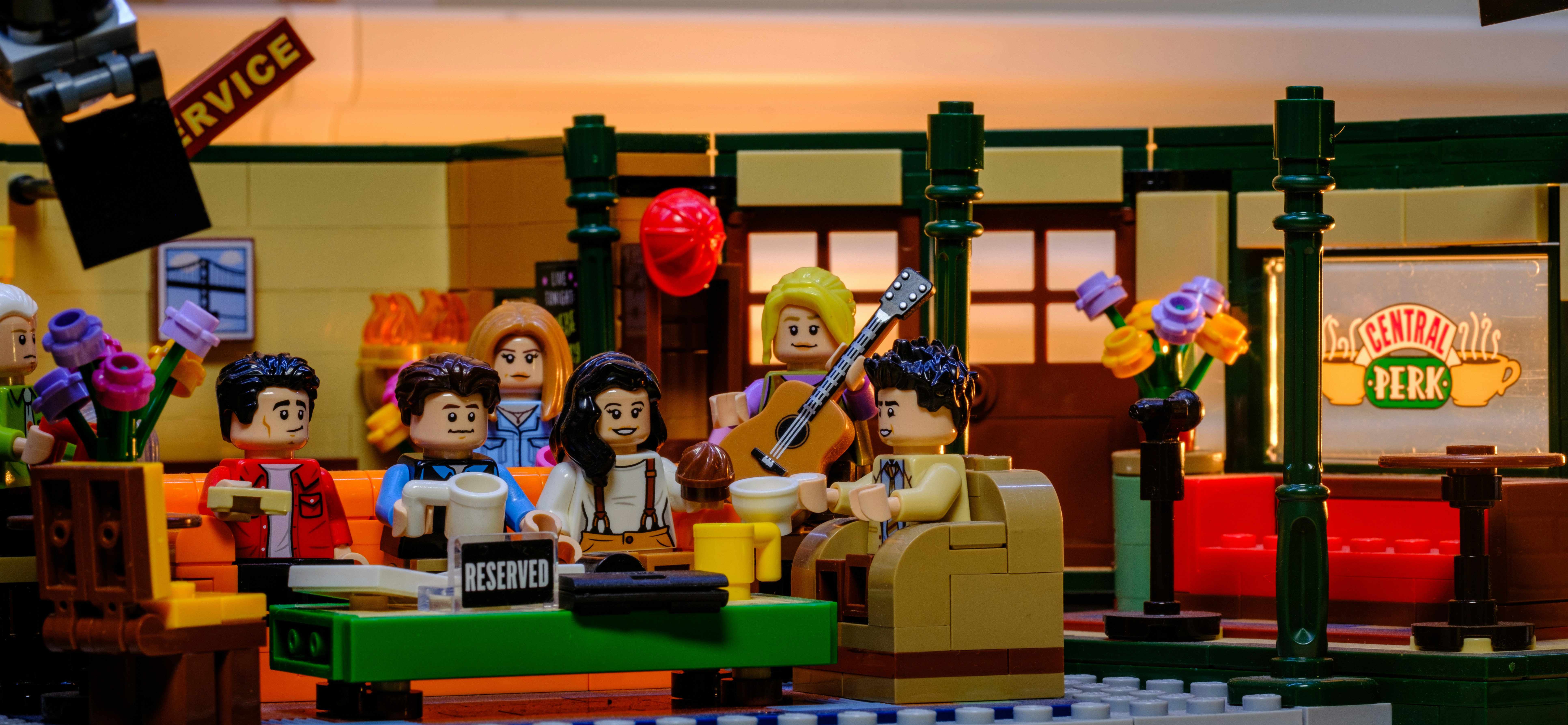A group of legos sitting on top of a green table photo – Free Lego ...