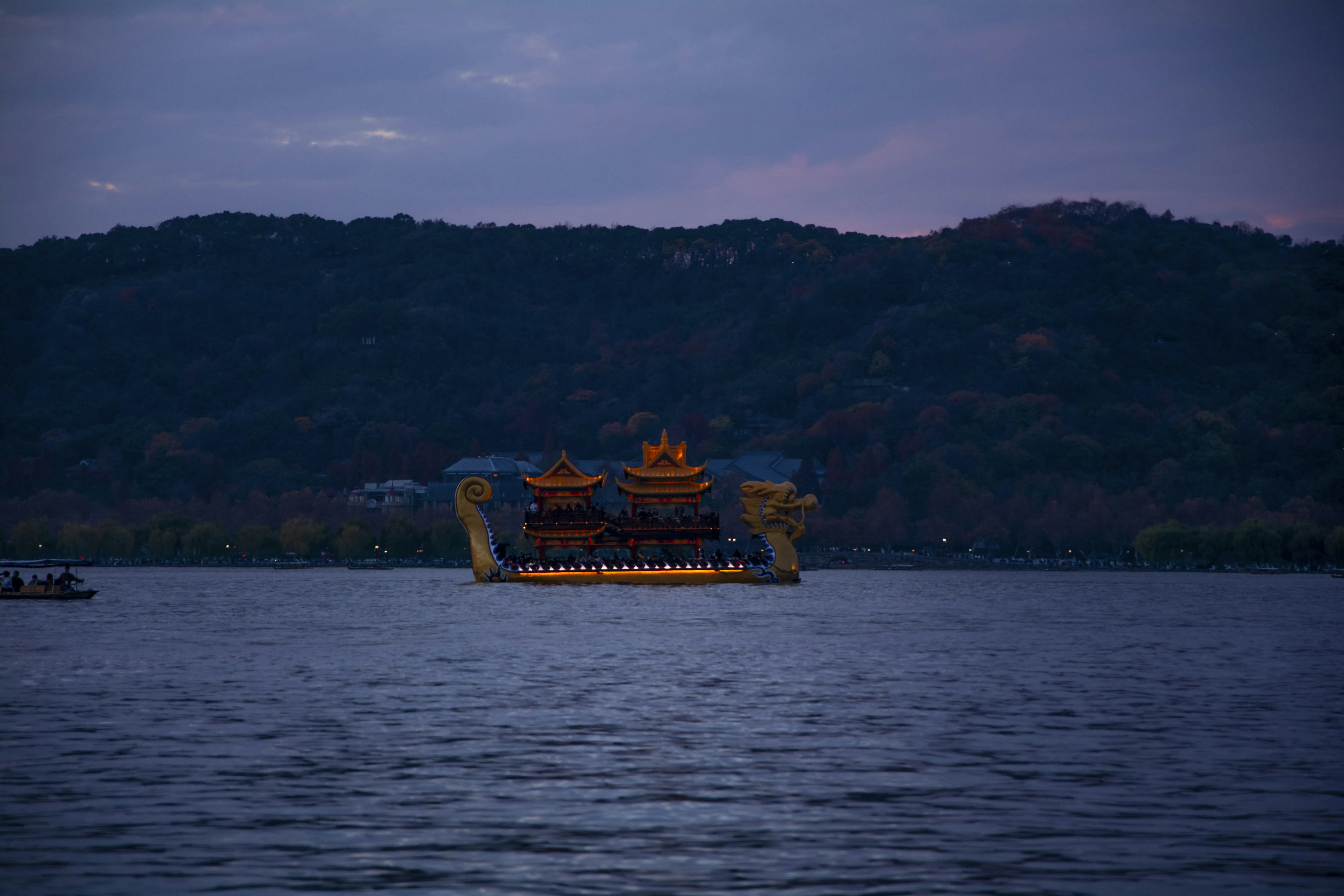Dragon-Boat Pagoda on a Quiet Lake at Dusk