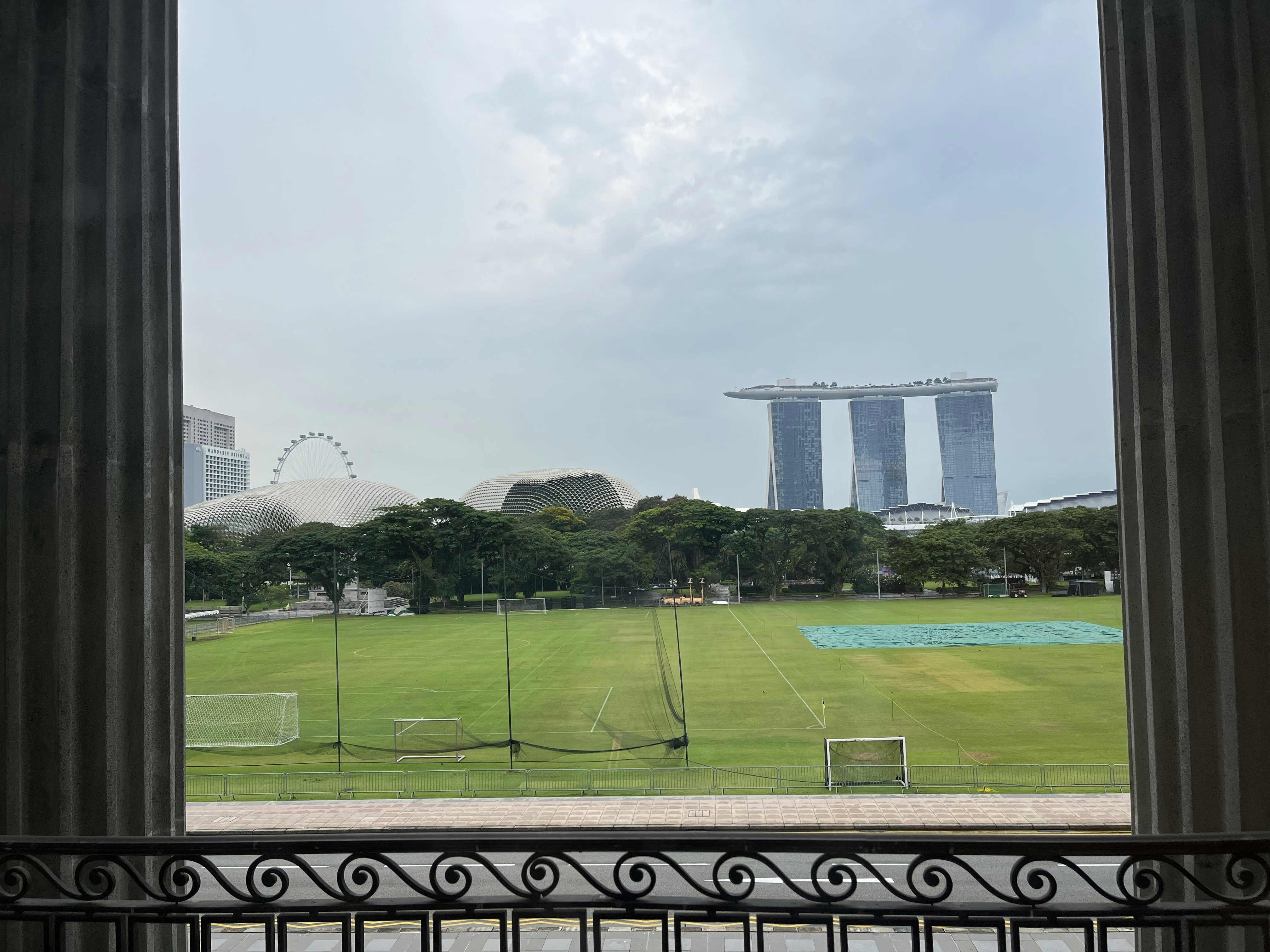 A view of a soccer field through a window photo – Free Singapore Image ...