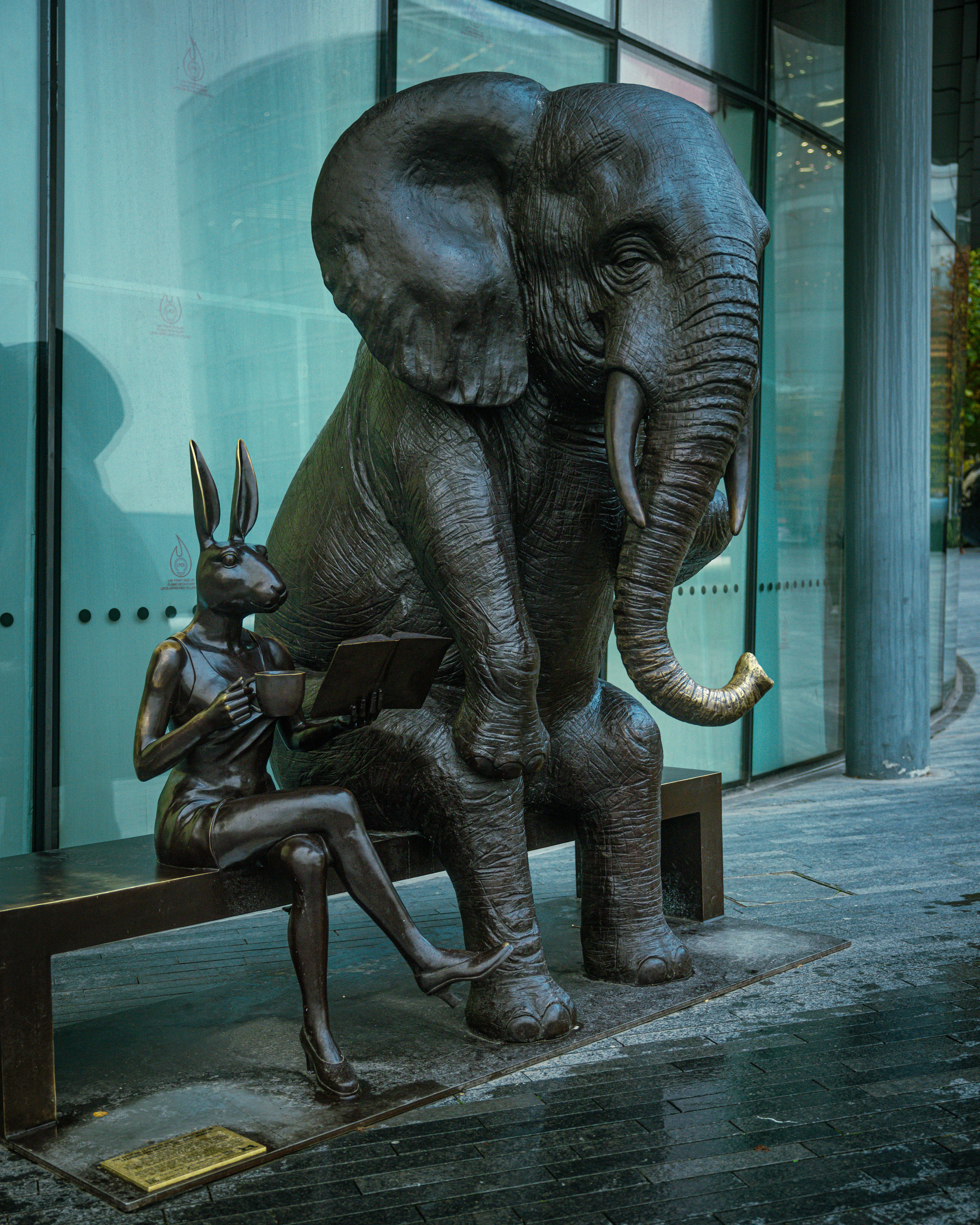 The Listening Elephant: Bronze Companions at Dusk