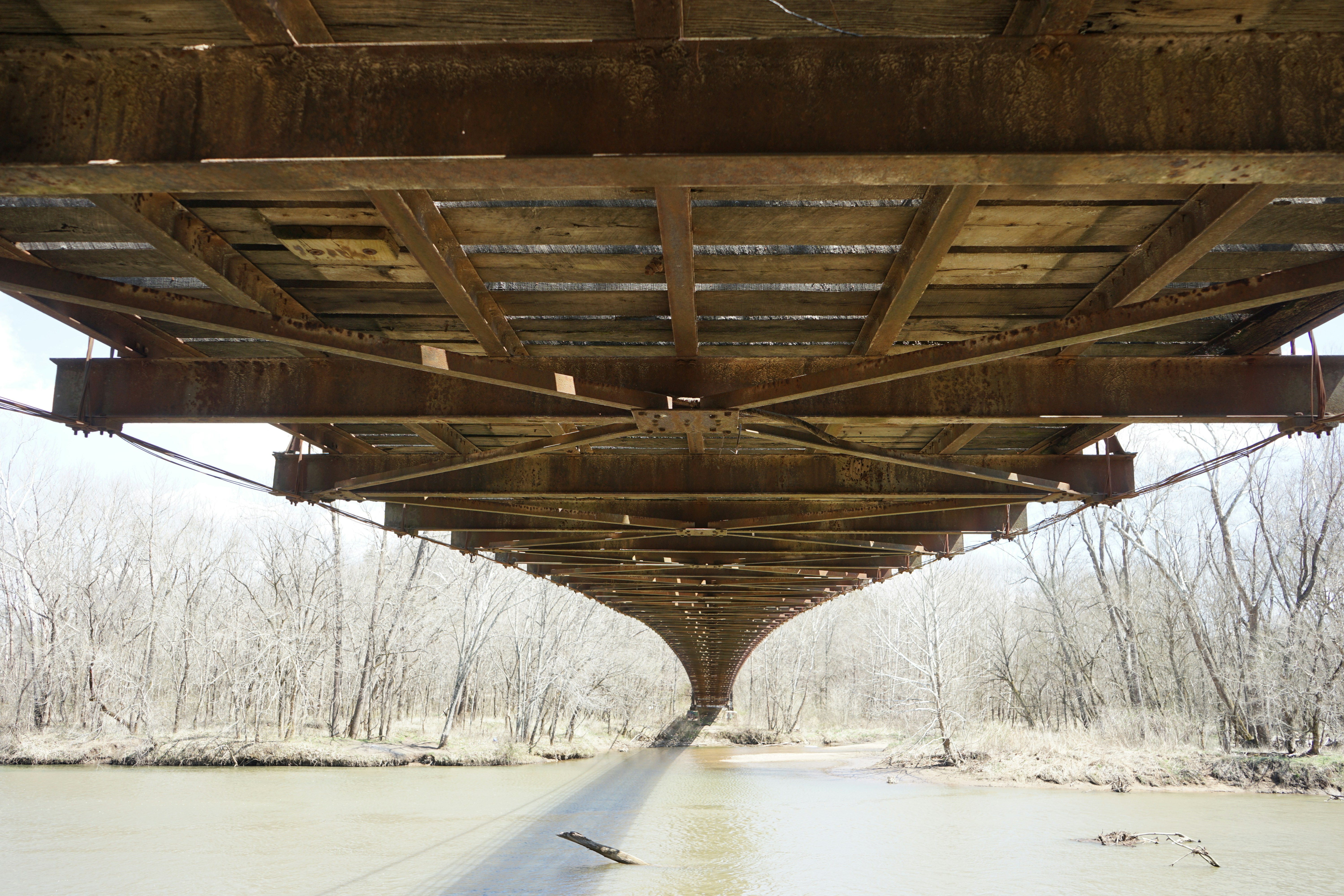 Under the Arc: Depth and Symmetry of an Iron Bridge
