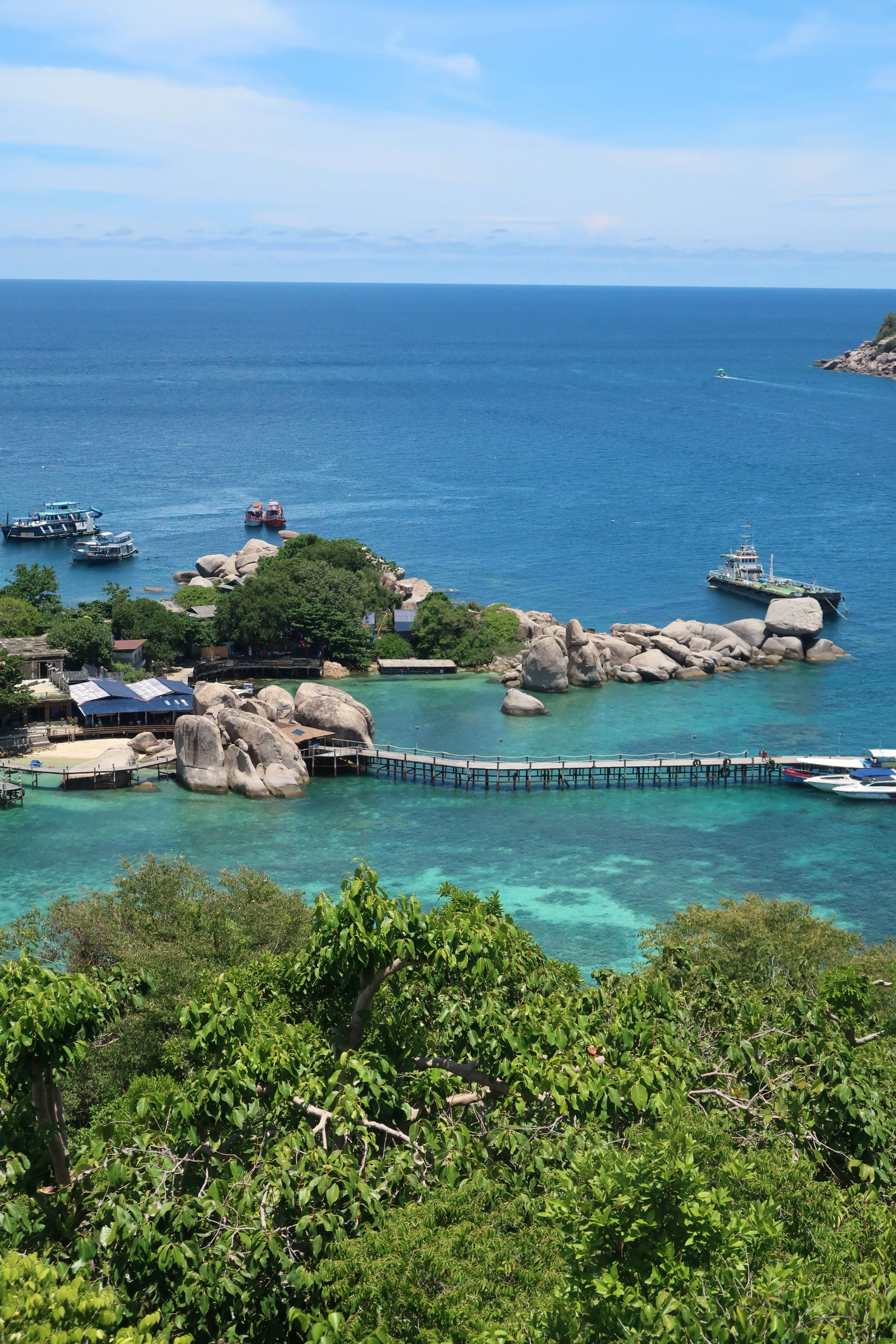 Azure Haven: Turquoise Waters and Stone Jetty