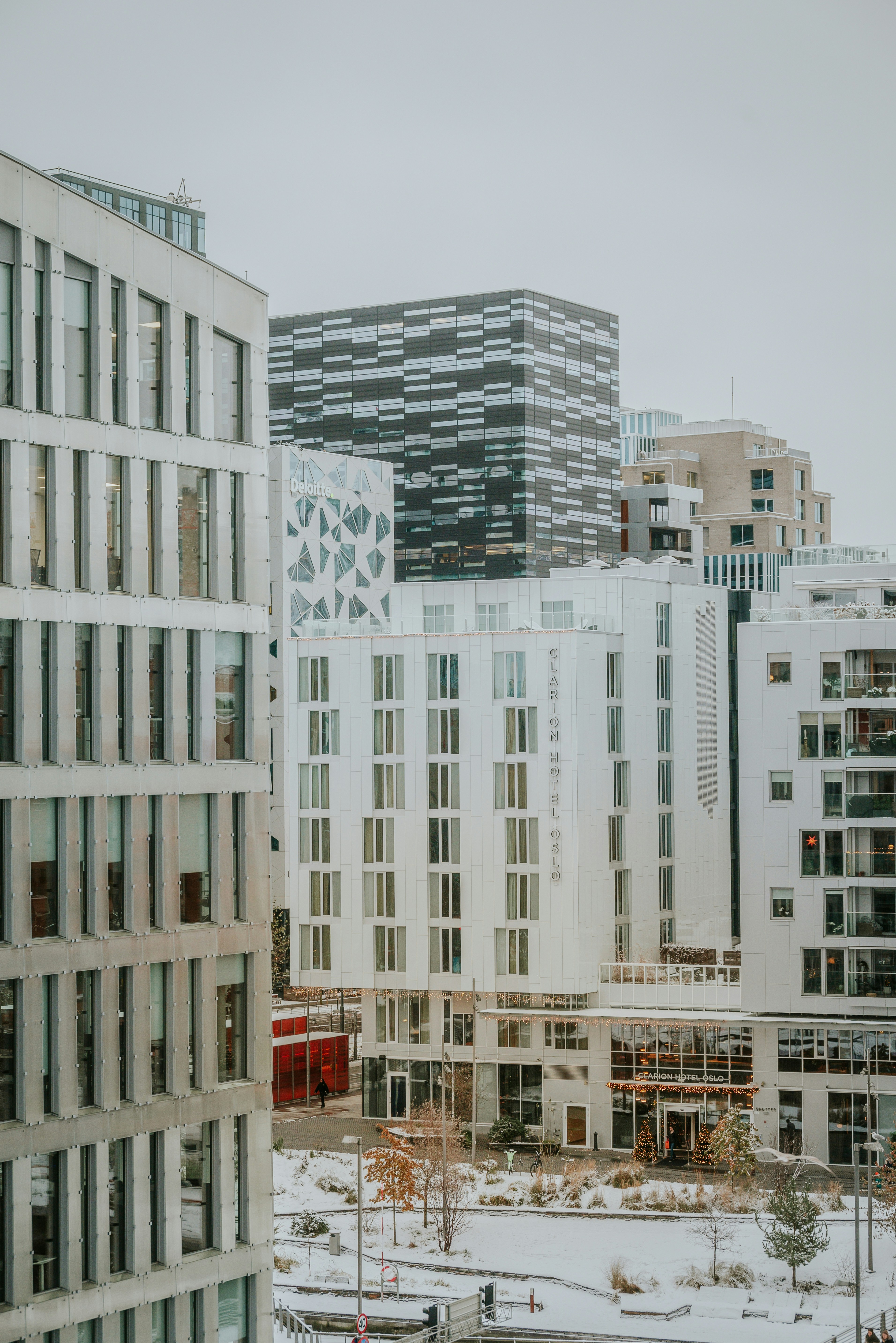 Snow-pale Skyline: A Quiet Cityscape with Modular Facades