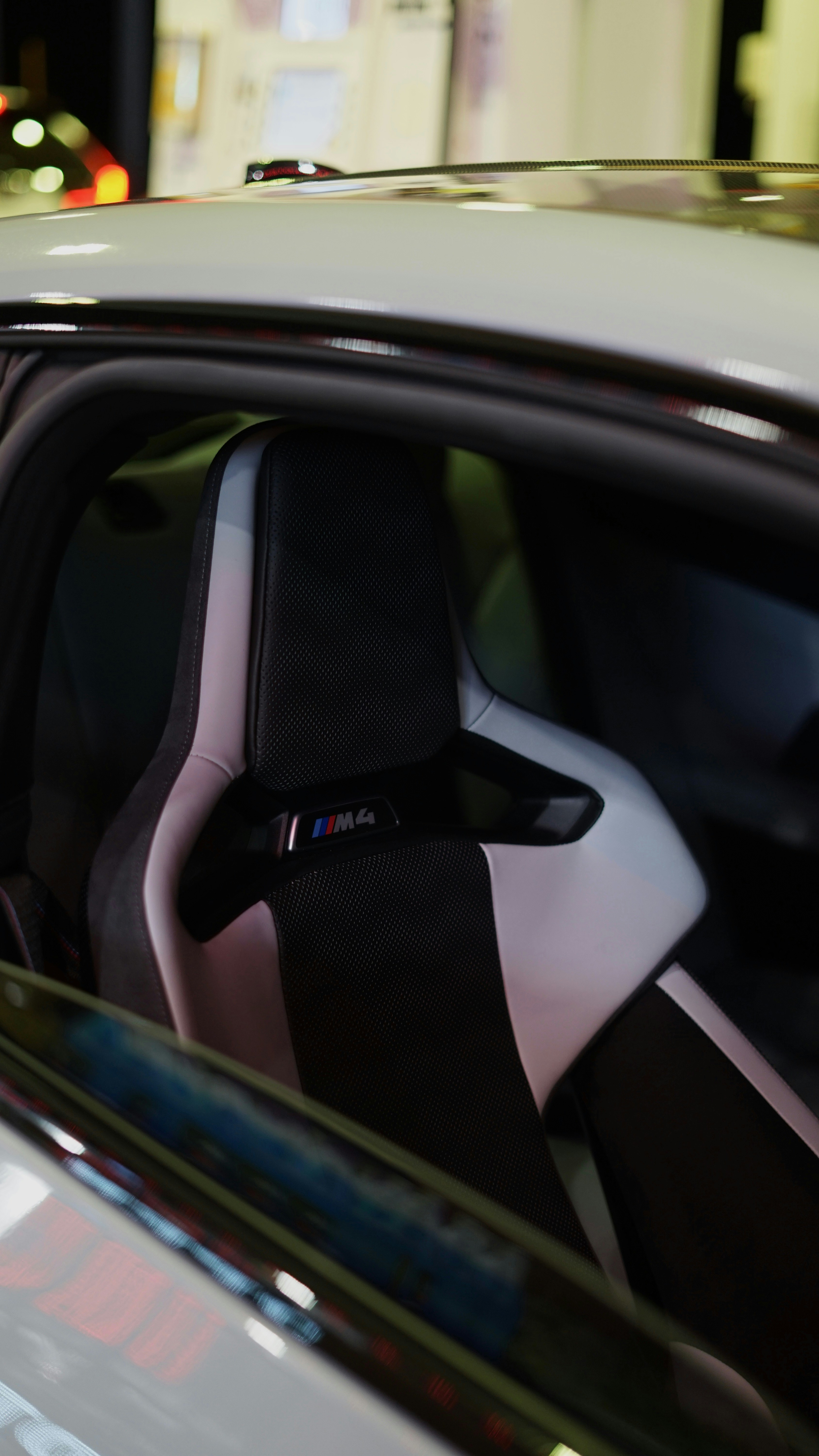 M Badge in Black and White: A Close-Up of BMW Sport Seat