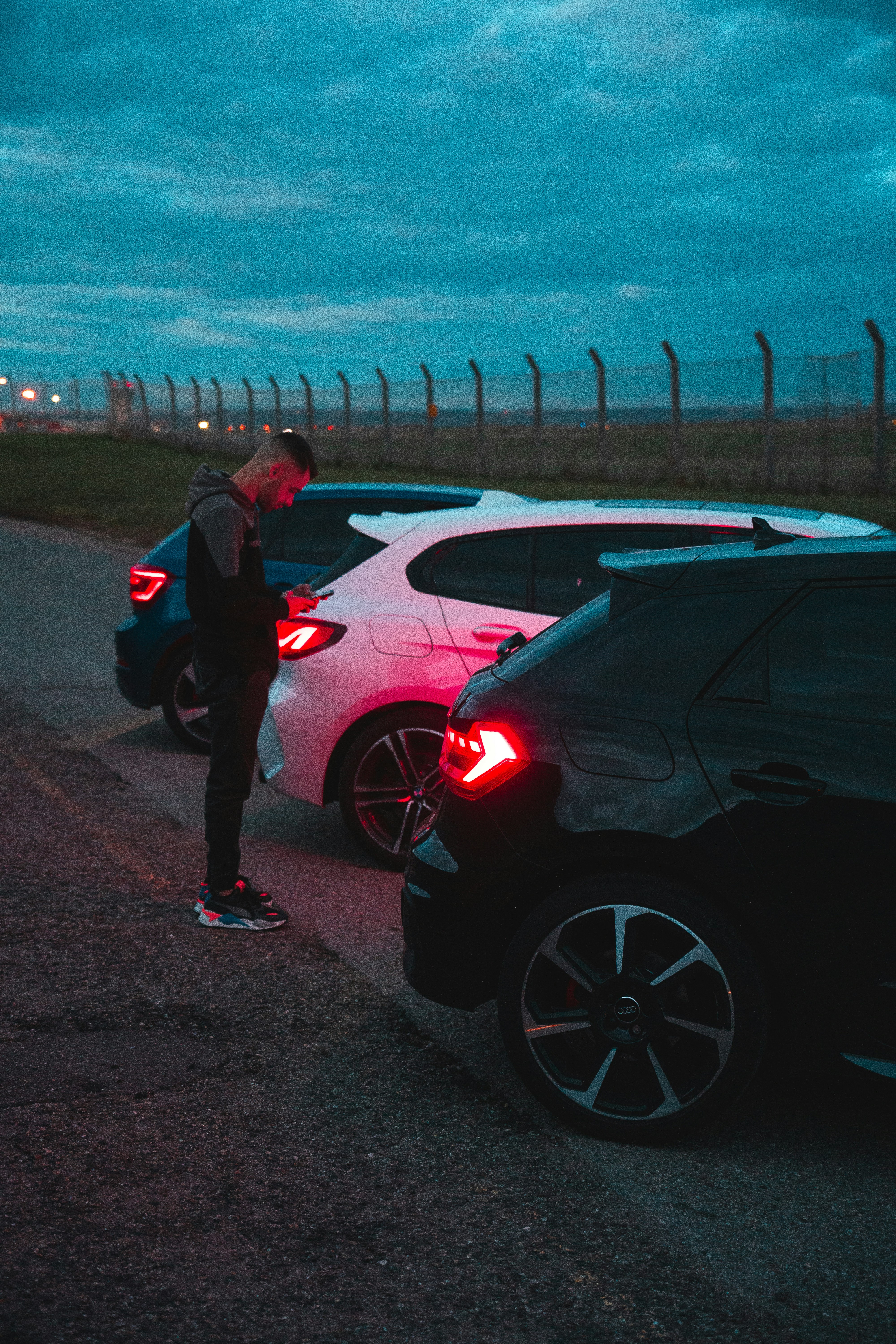 Dusk Ritual by the Tail Lights