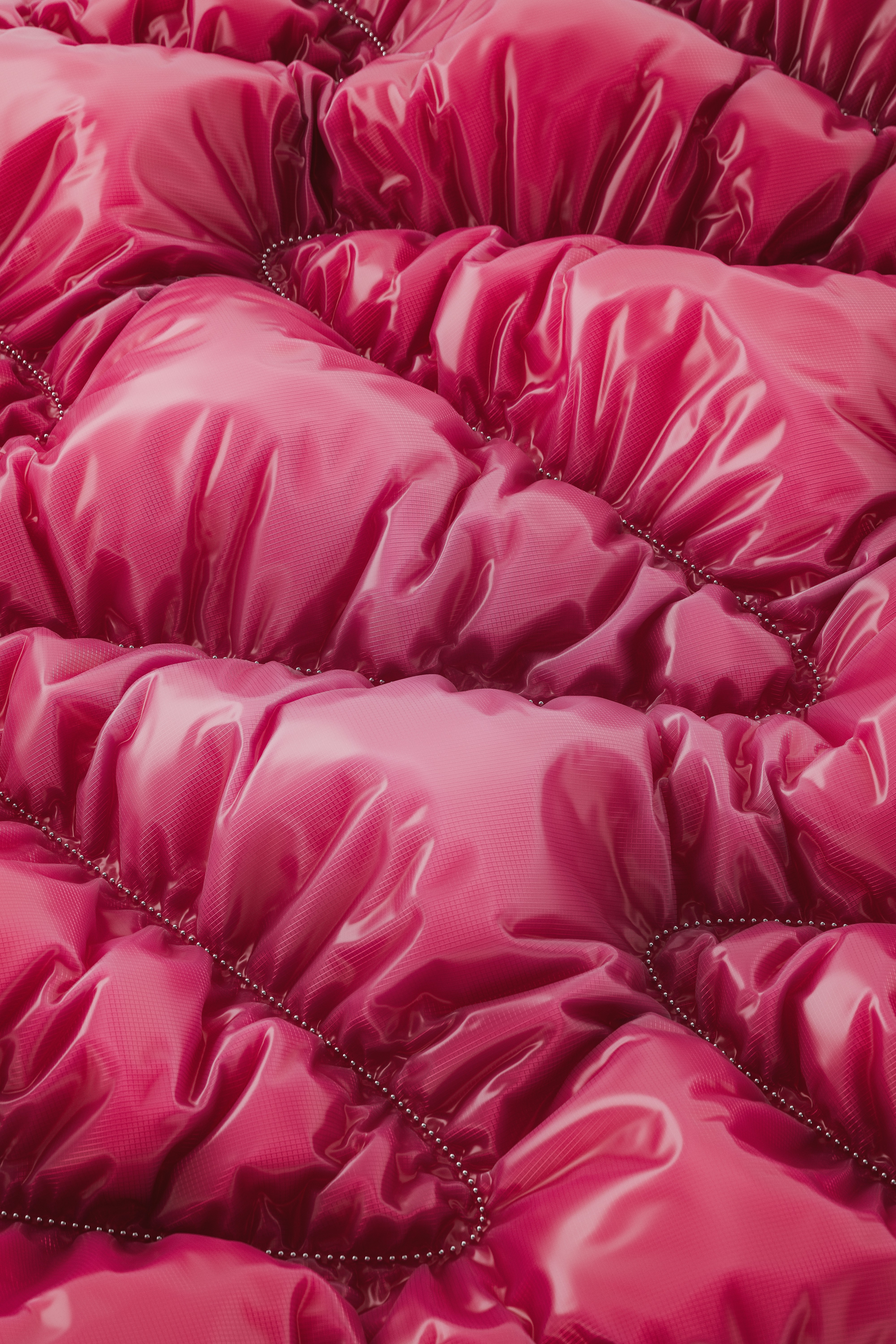 A close up of a pink comforter on a bed photo – Free Texture Image on ...