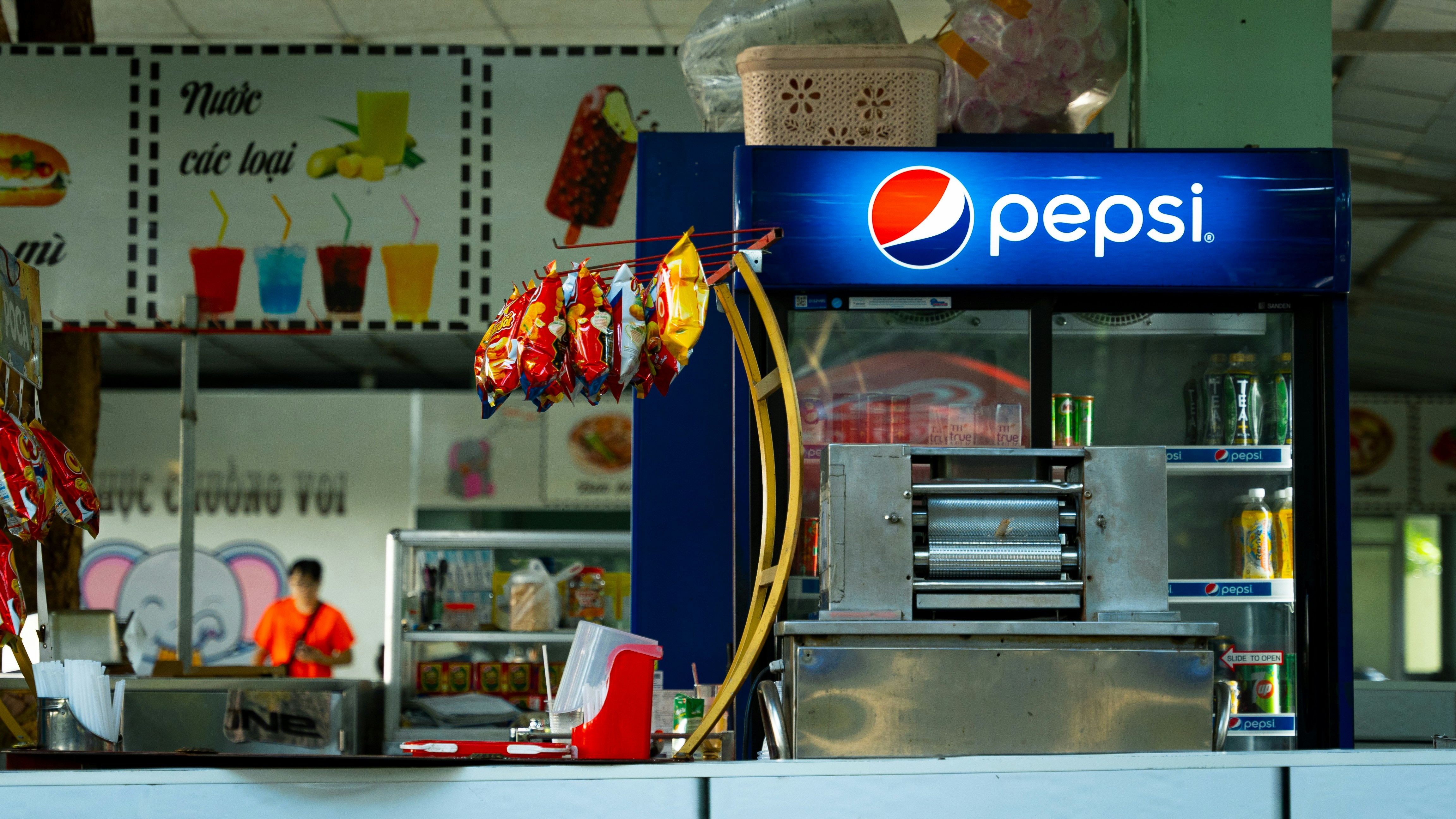 A pepsi machine sitting inside of a store photo – Free Ho chi minh ...