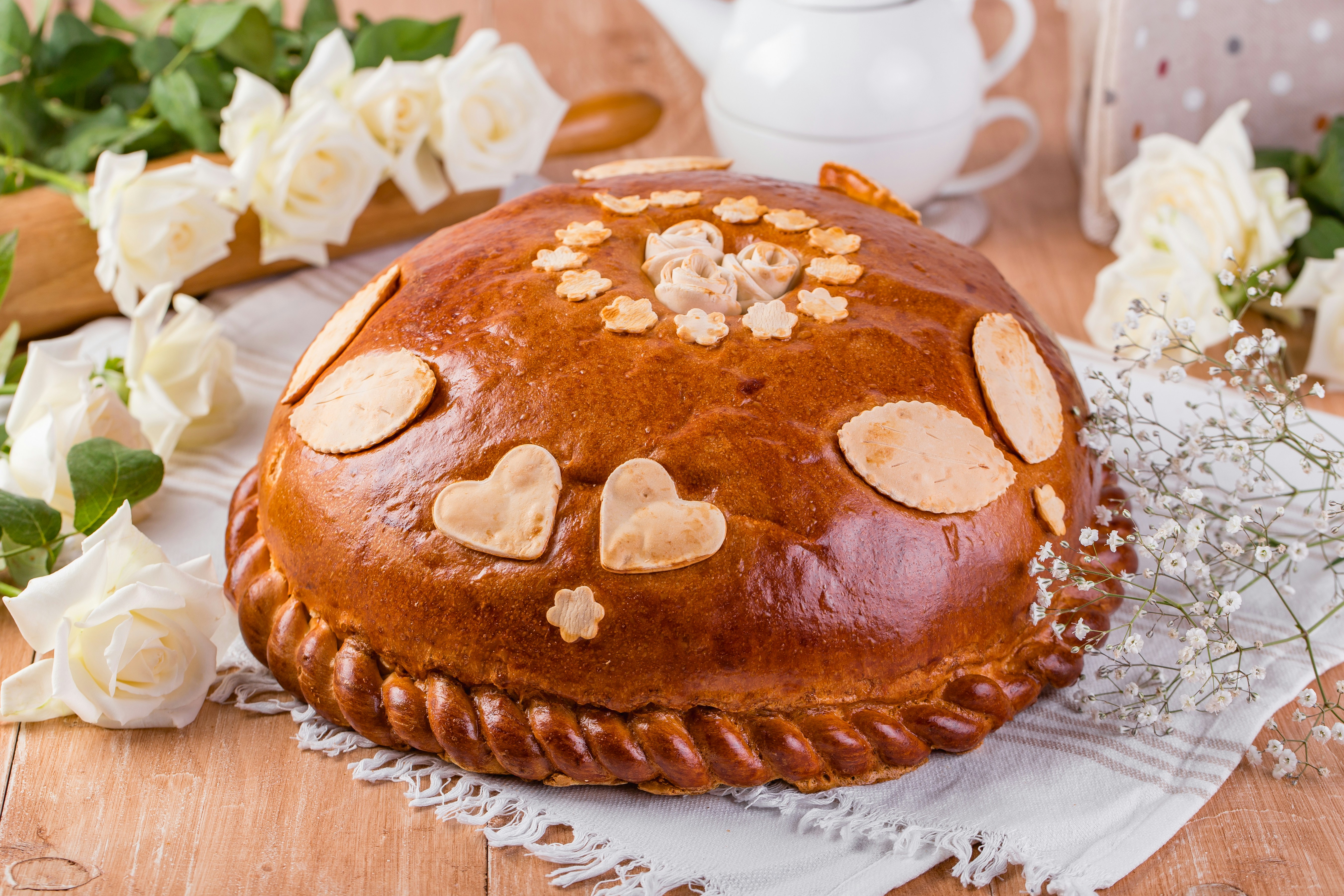 Heart-Focused Brioche Pie: A Golden Centerpiece on Lace
