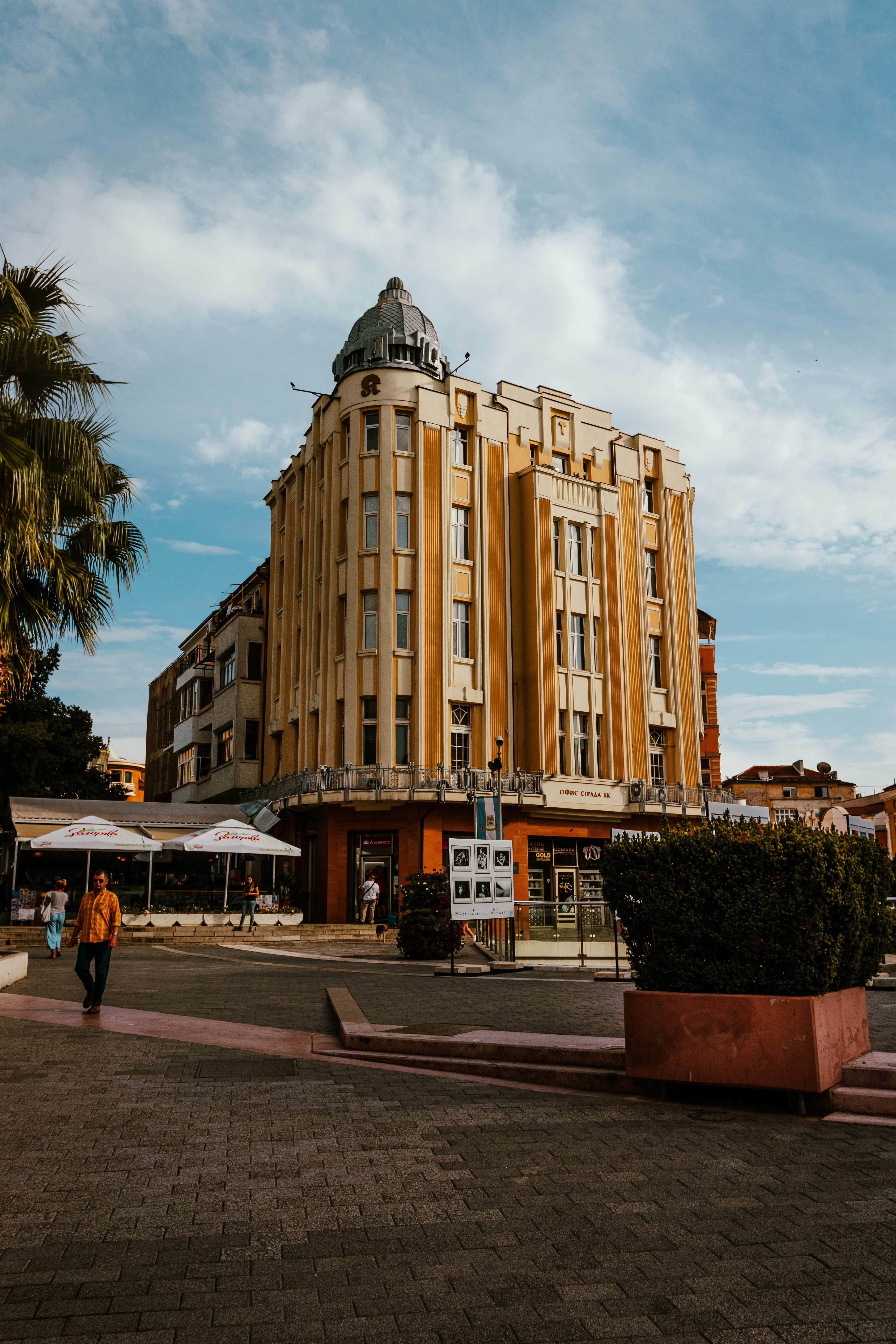 a tall building with a clock on the top of it