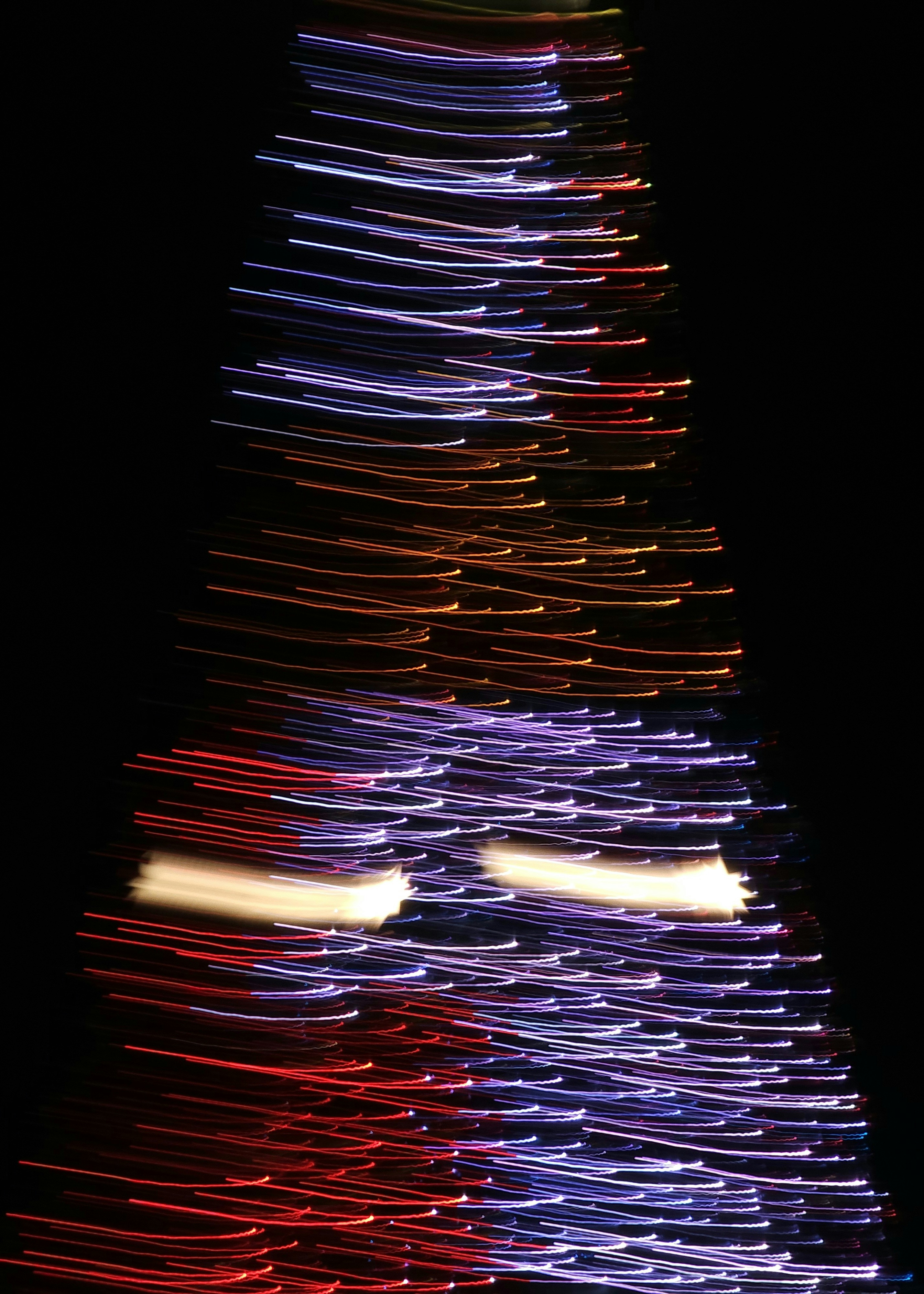 Low-light Spiral: Neon Streaks in Motion