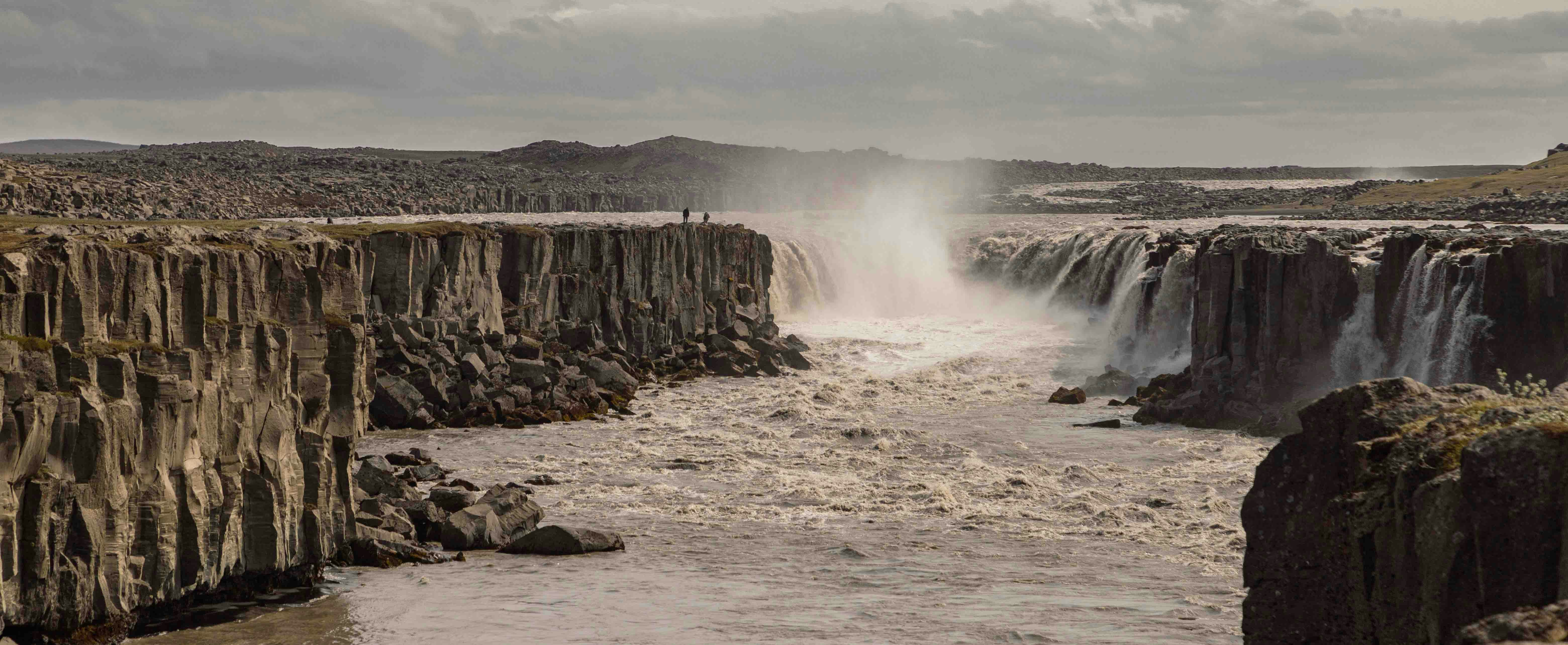 Basalt Gorge Falls: Spray Across Twilight Rift