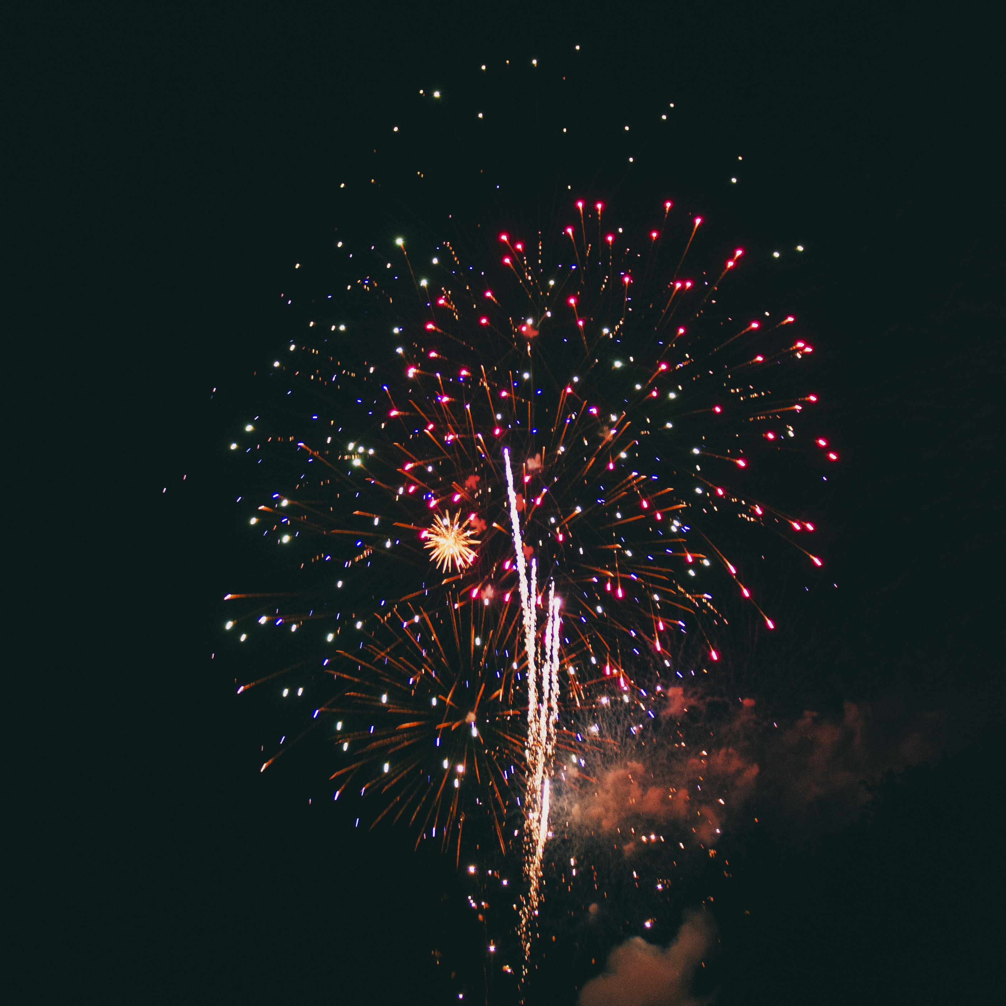 A large fireworks is lit up in the night sky photo – Free Fireworks Image on Unsplash
