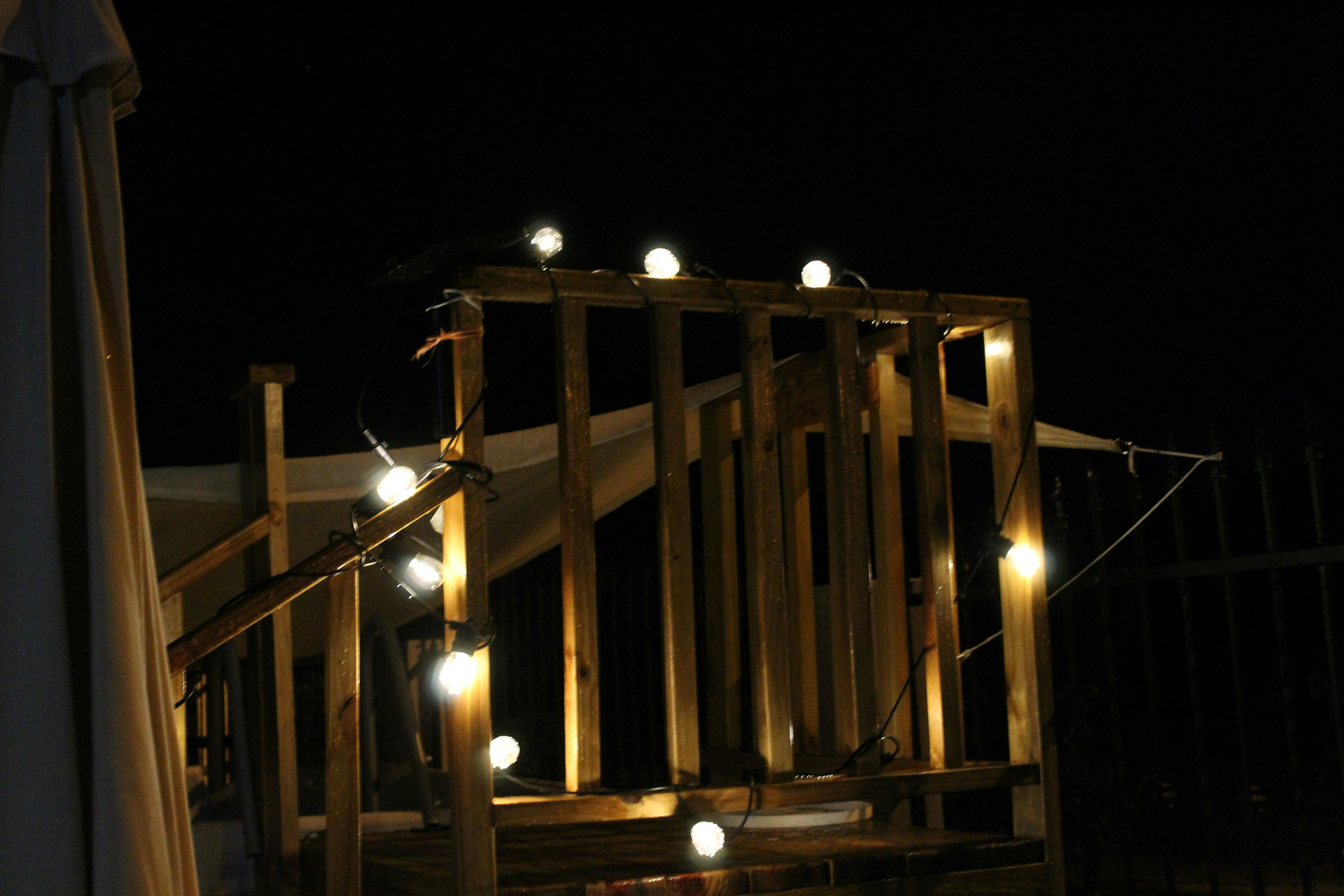 Evening Orbs Draped Across a Weathered Deck