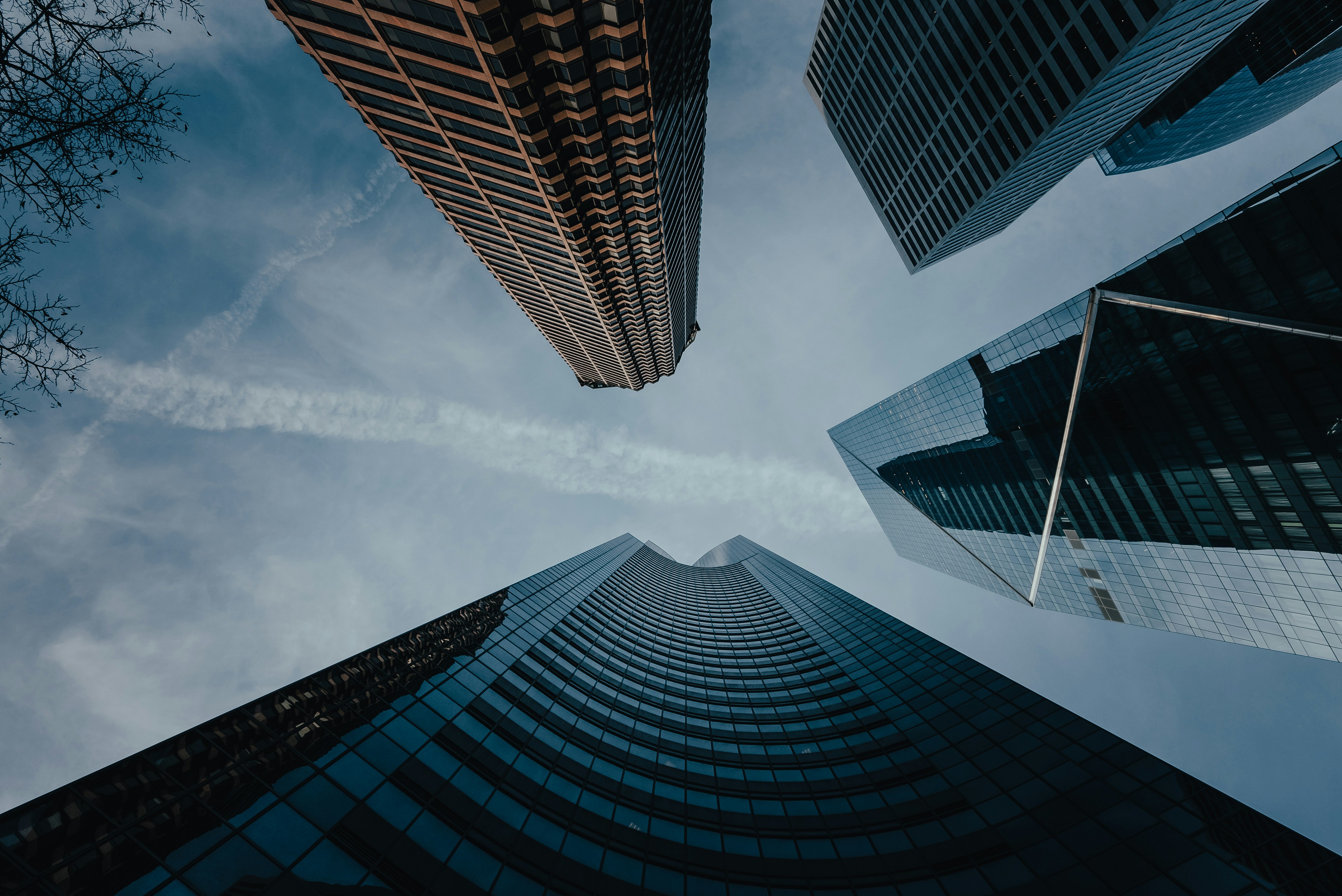 Looking up at tall buildings in a city photo – Free Grey Image on Unsplash
