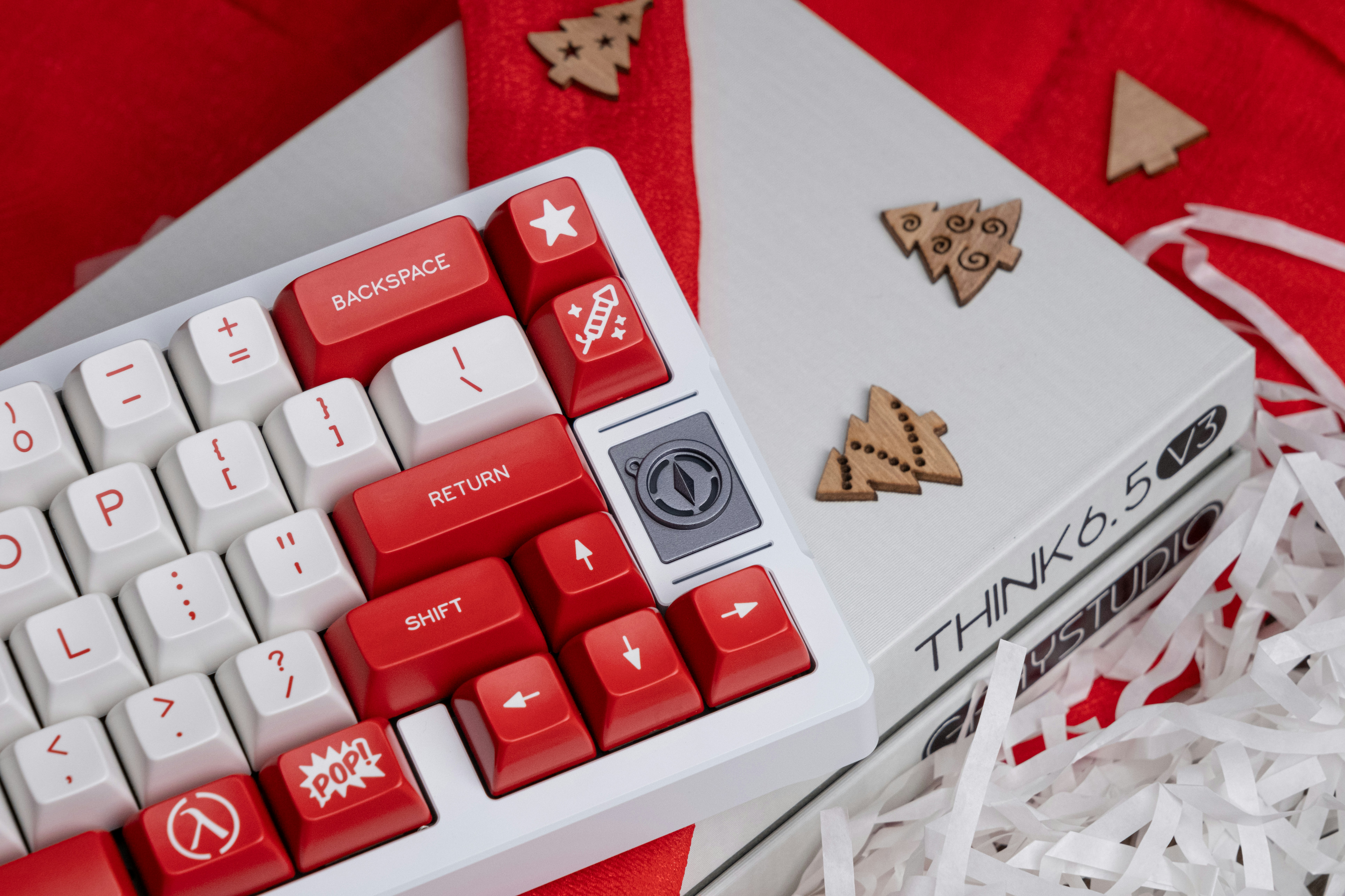 A red and white keyboard sitting on top of a white box photo – Free ...