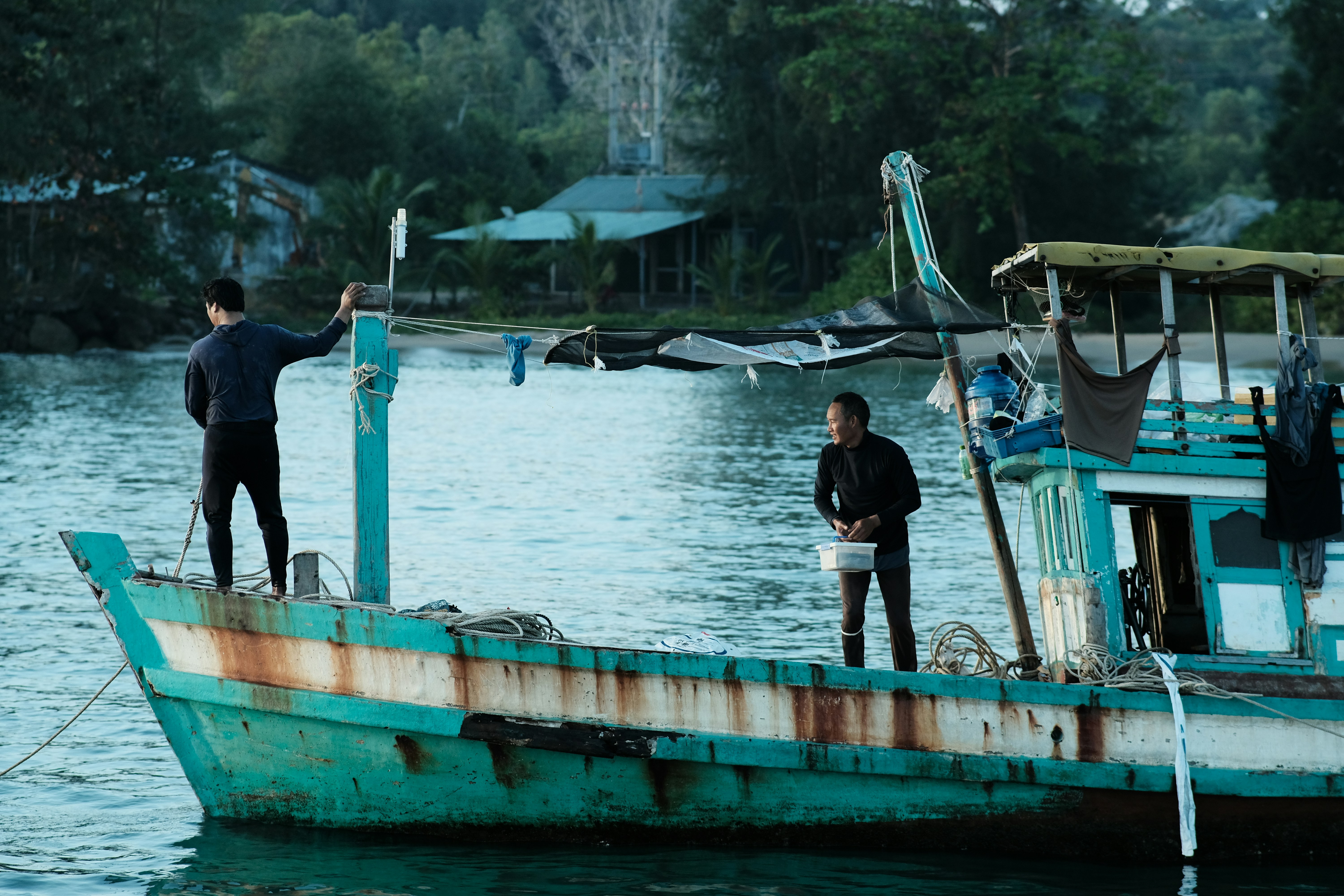 Weathered Workboat on Quiet Coastal Waters