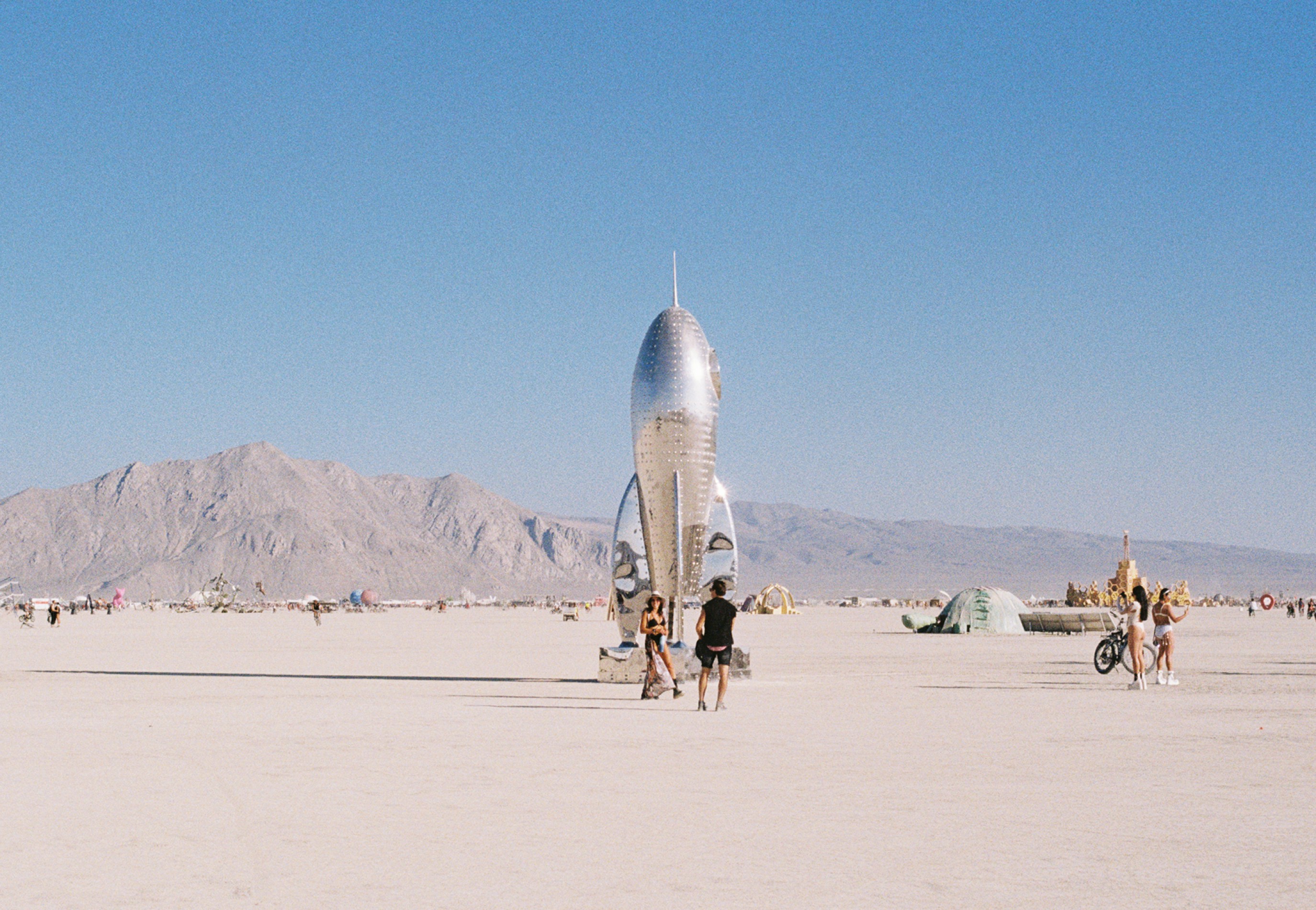 A group of people standing around a space shuttle photo – Free Black ...