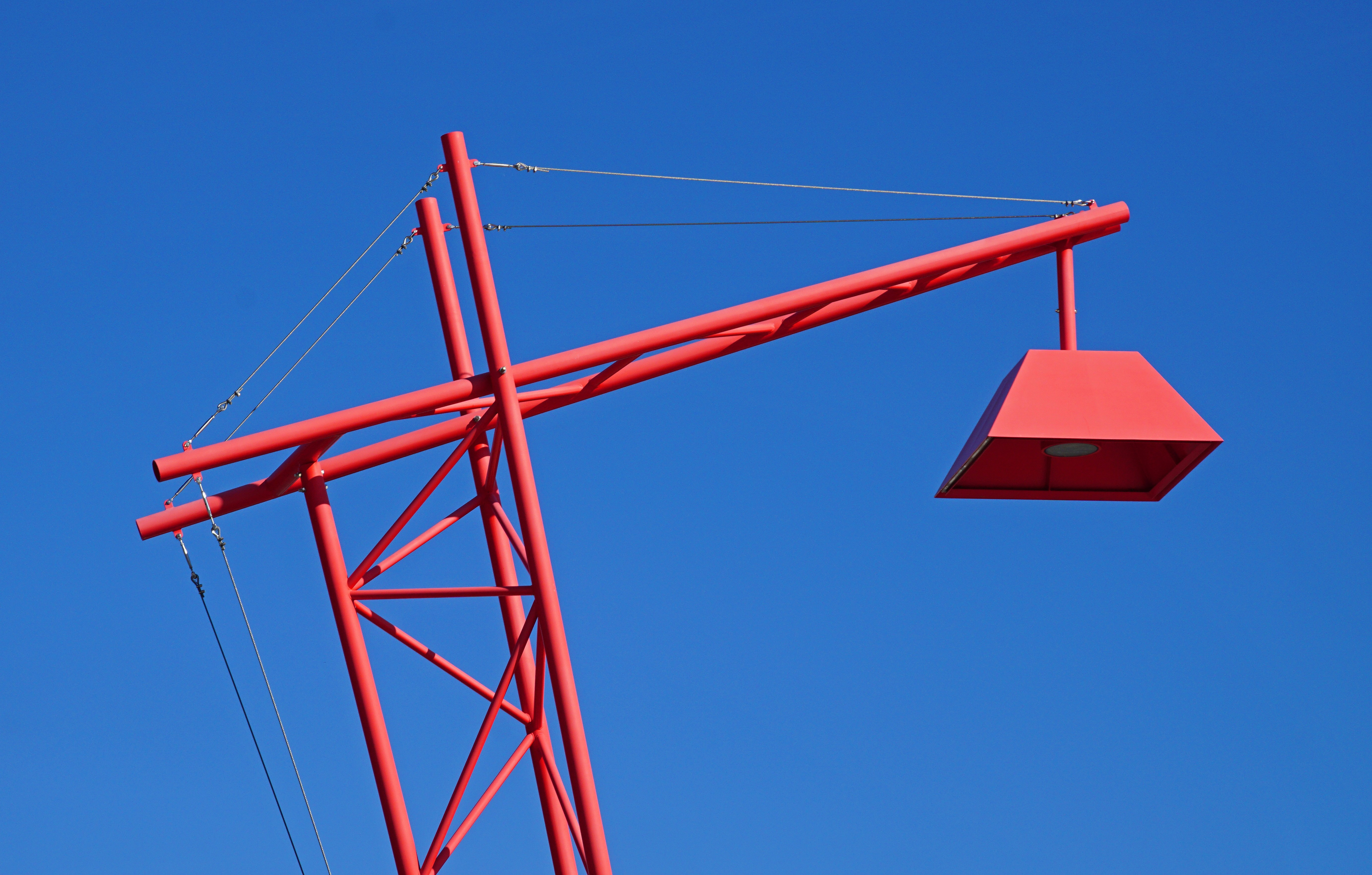 Crimson Lattice Against a Cerulean Sky