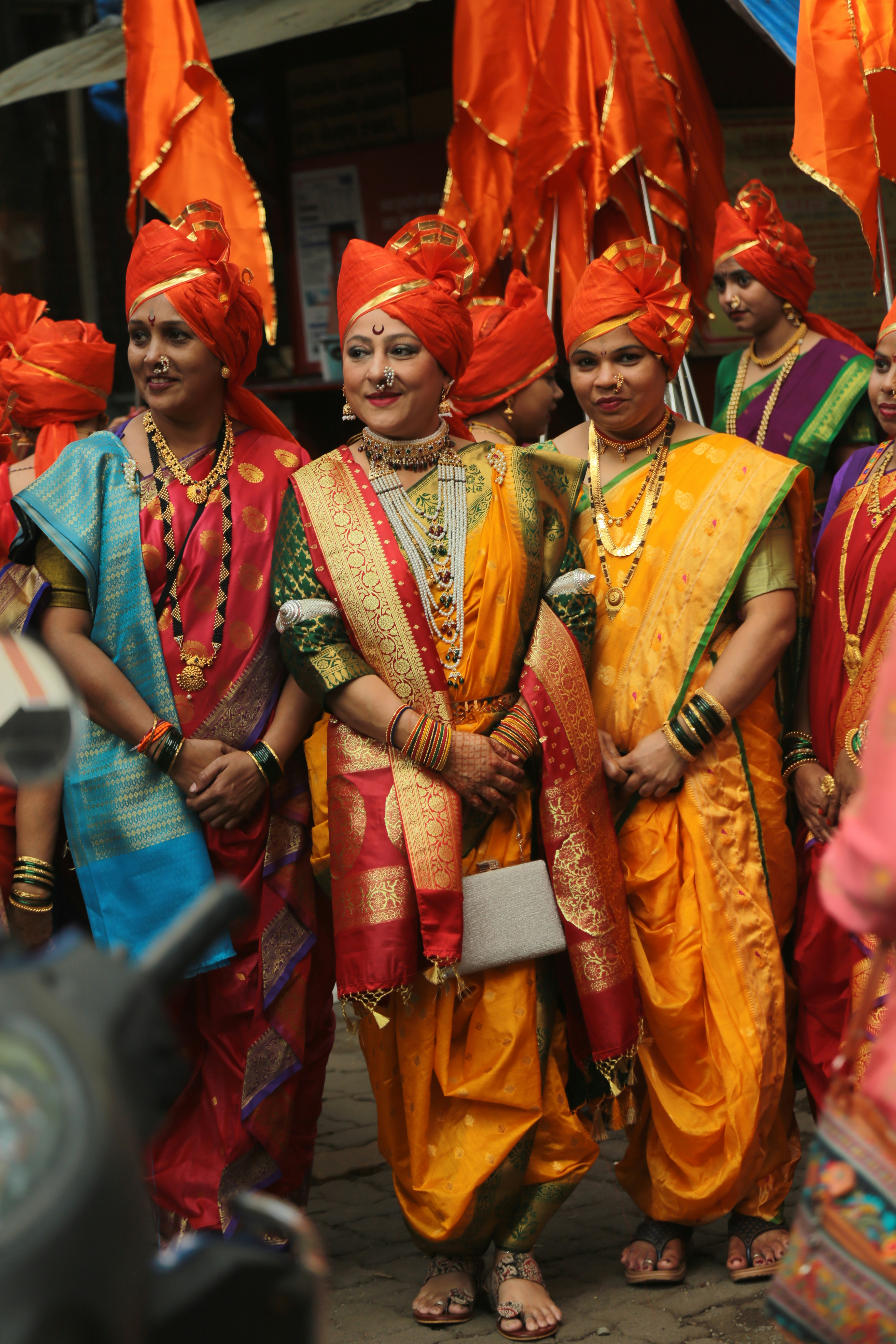 A group of women dressed in colorful indian garb photo – Free Wedding ...