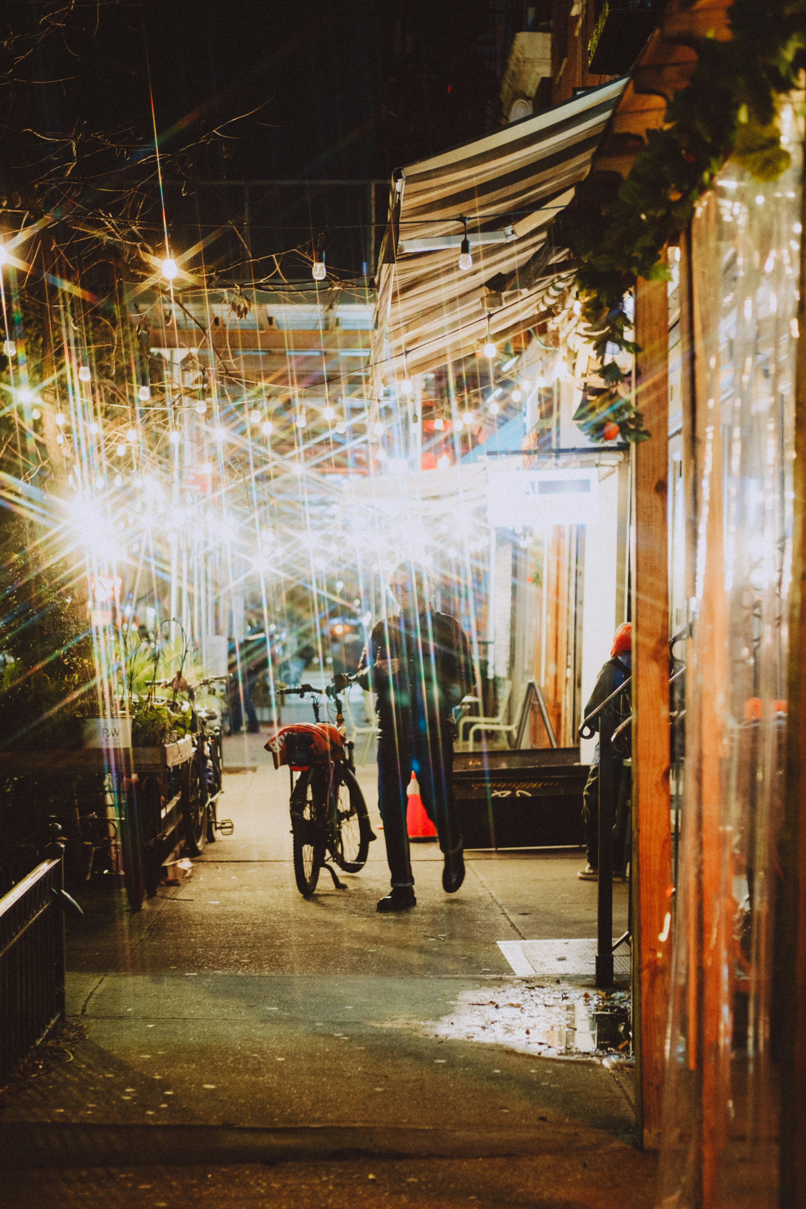 Neon Alley: A Night Stroll Beneath String Lights