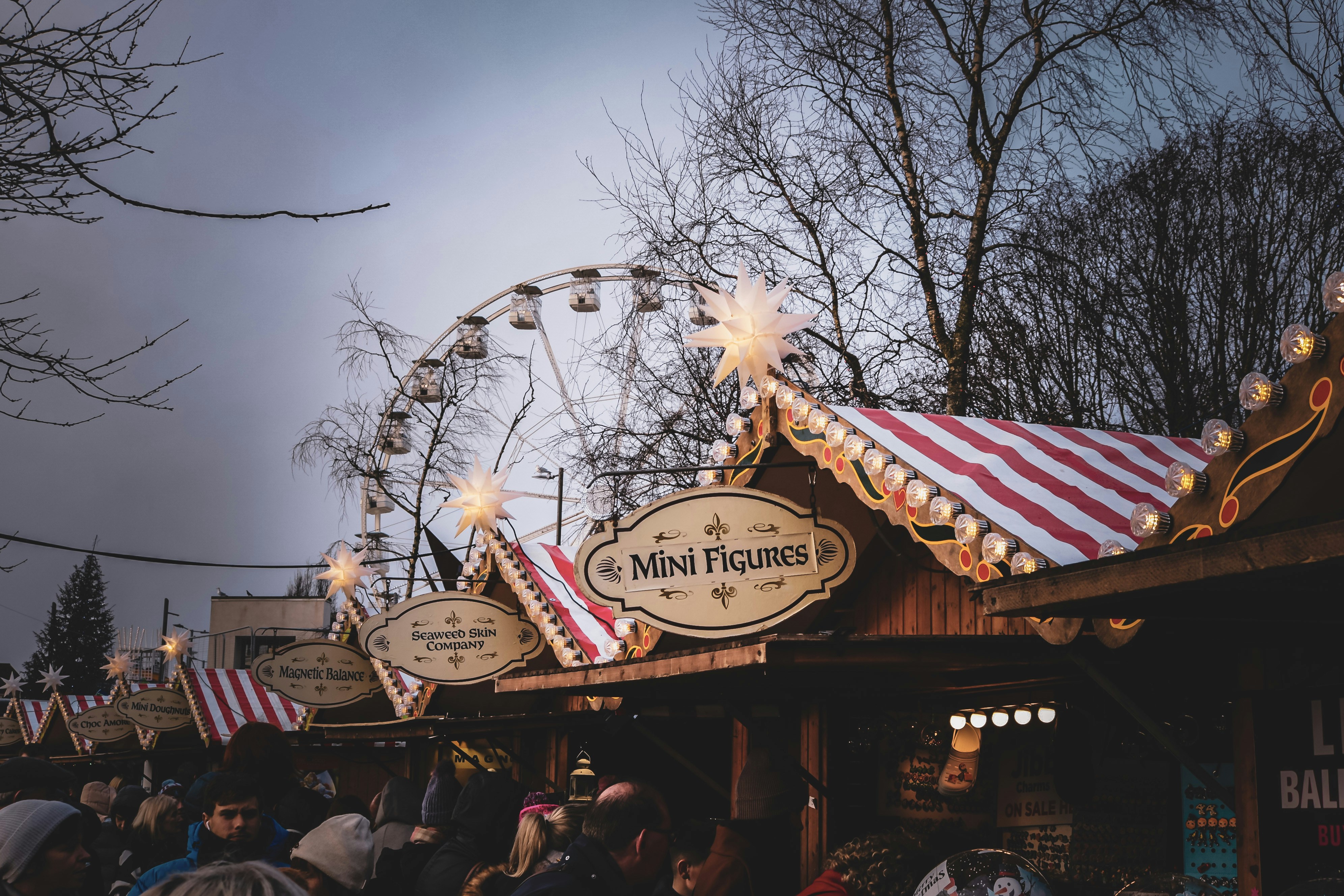 Mini Figures Market: Striped Canopies and a Distant Ferris Wheel