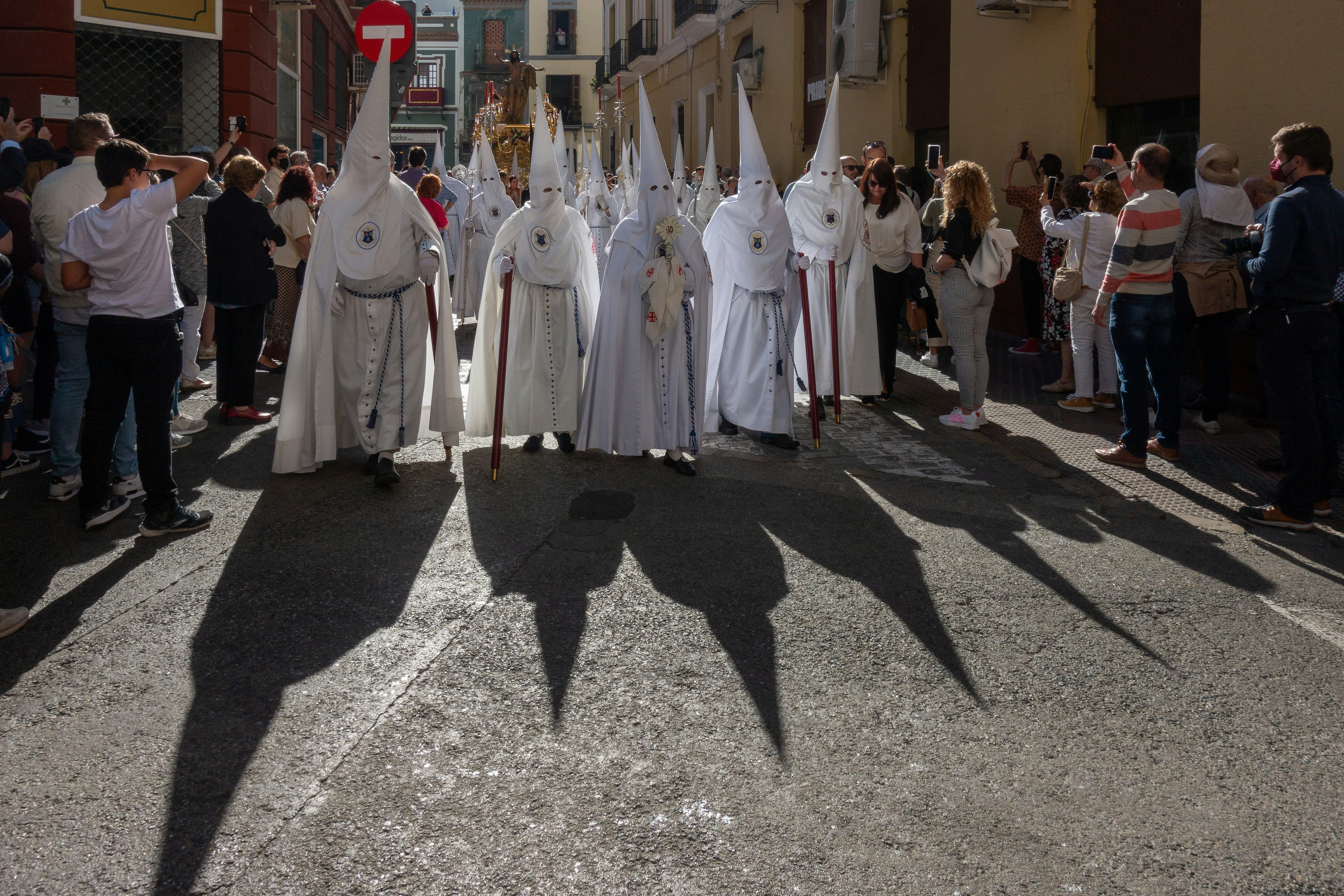 Ceremonial Procession in Sunlit Street