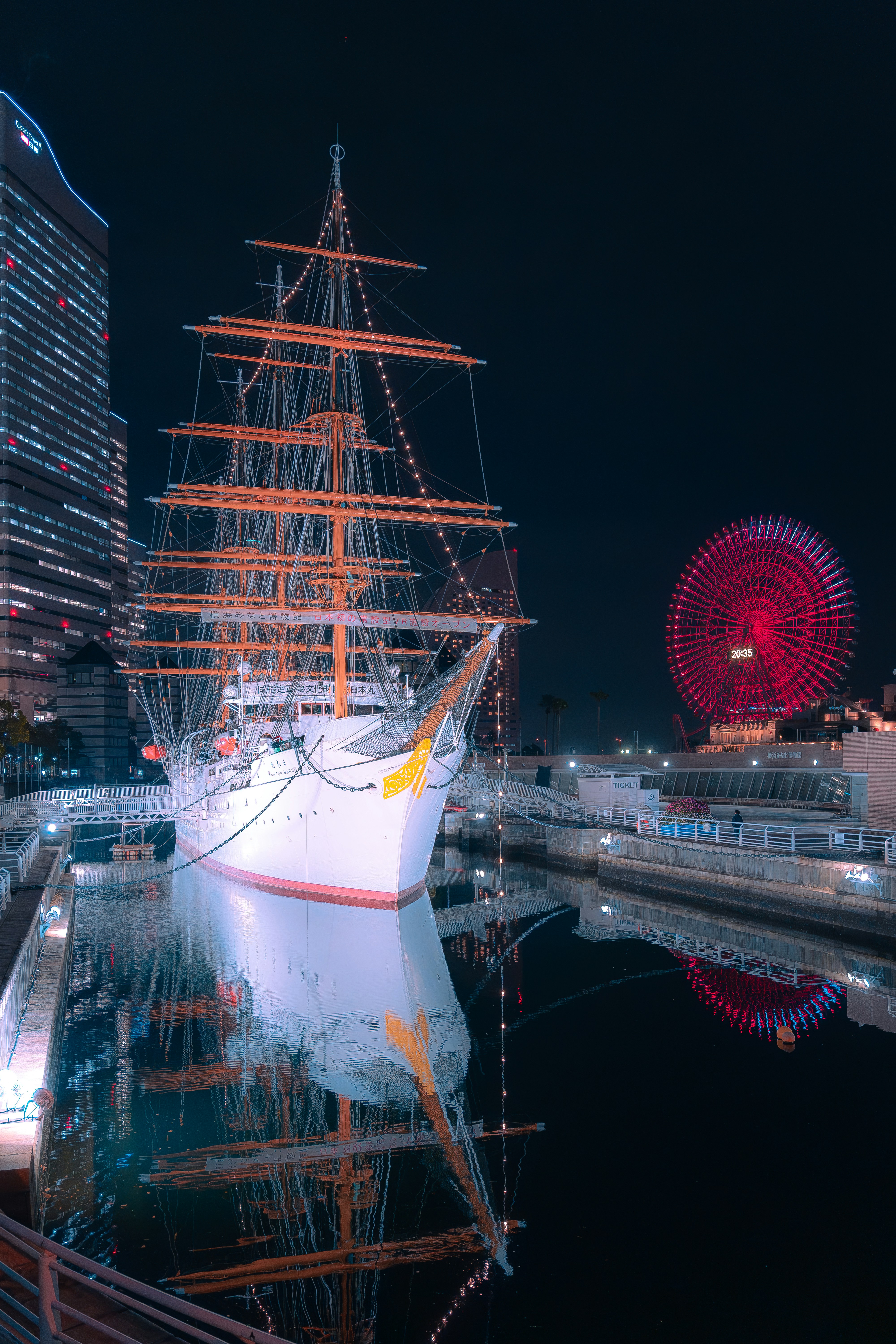 Moonlit Galleon at the Harbor: Reflections under a Neon Ferris Wheel