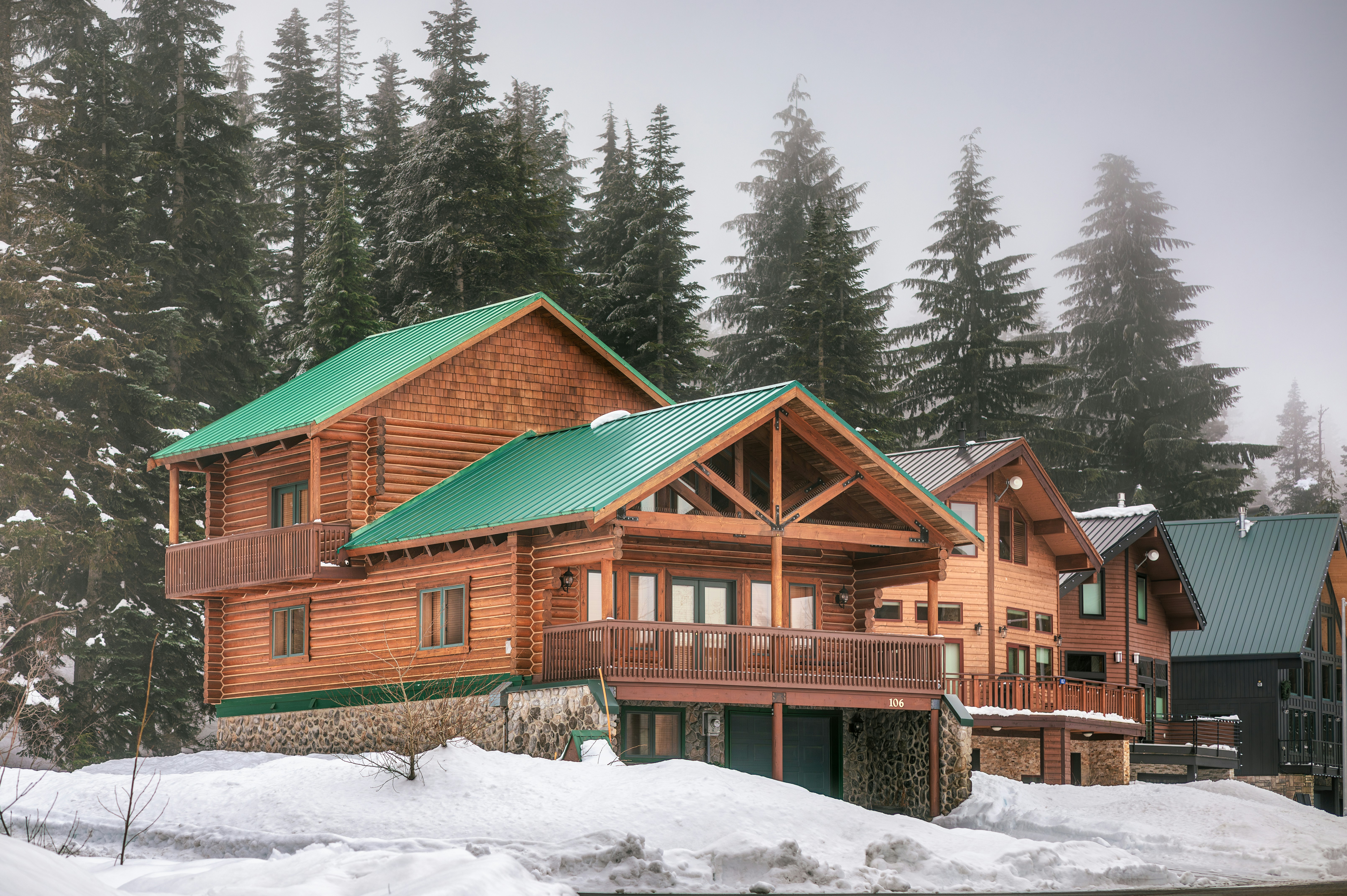 A large log cabin with a green roof photo – Free Ellensburg Image on ...