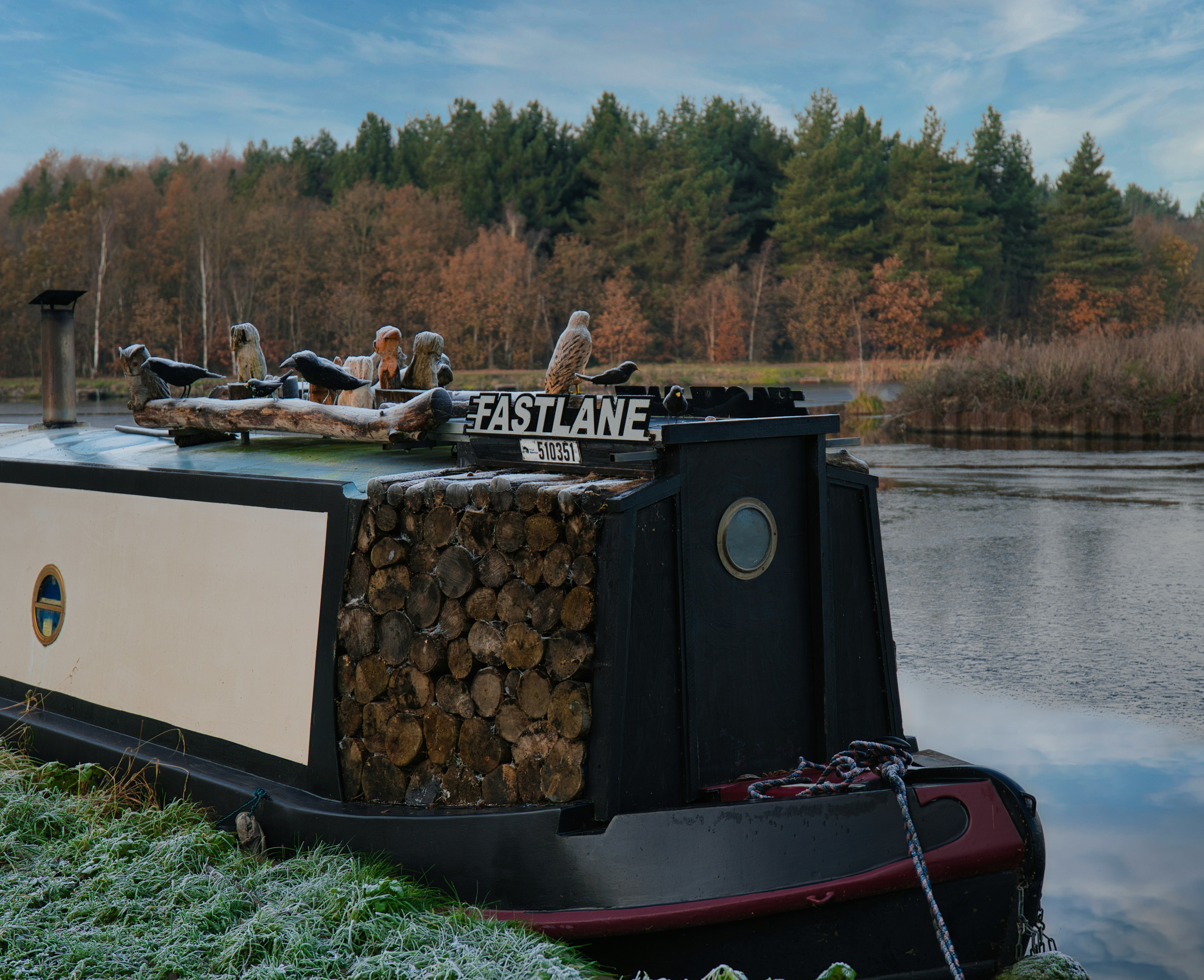 Autumn Firewood on a Quiet River: A Narrowboat Portrait