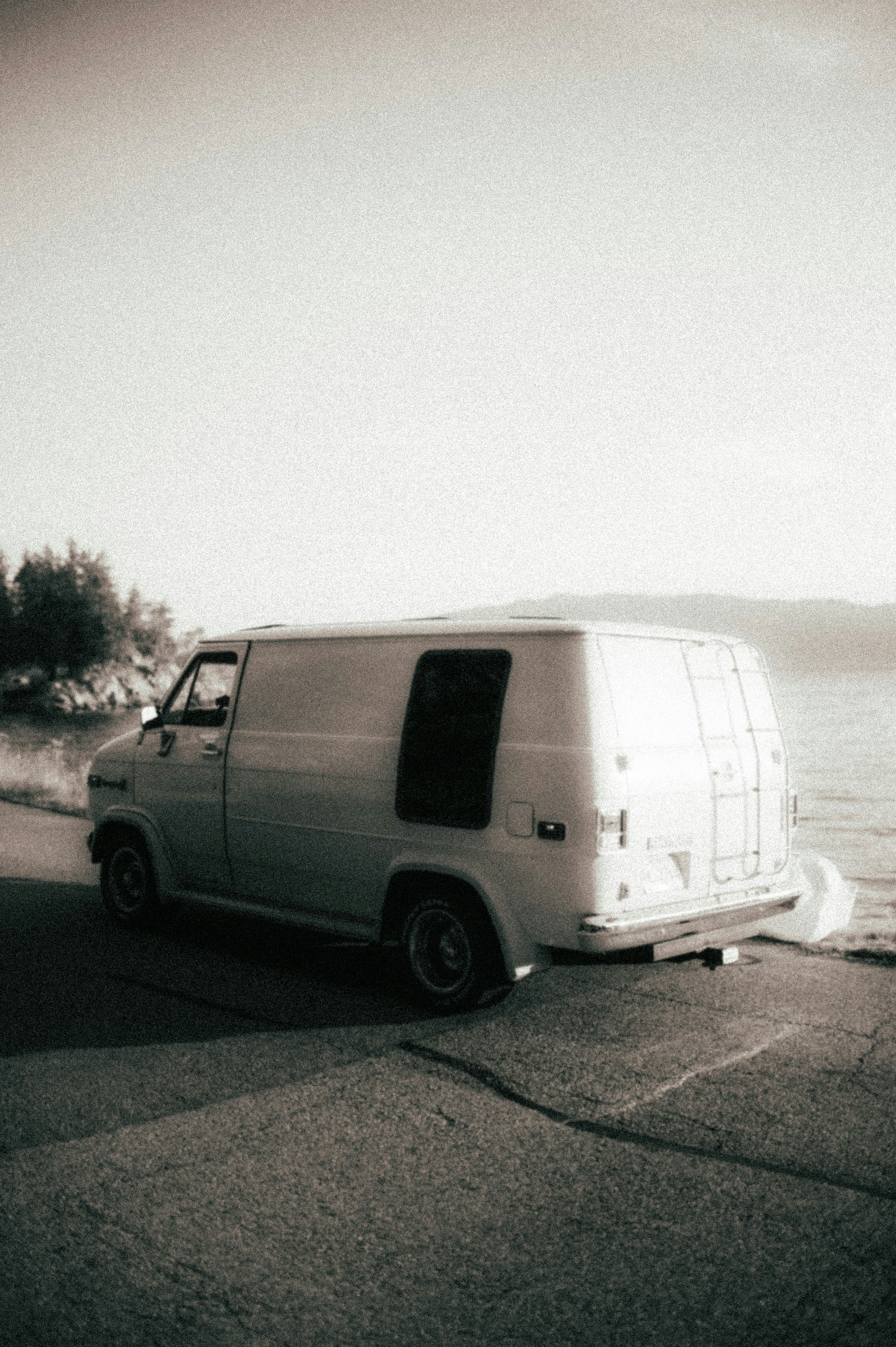 Sepia Lakeside Van at Dusk: A Quiet Road-Trip Moment