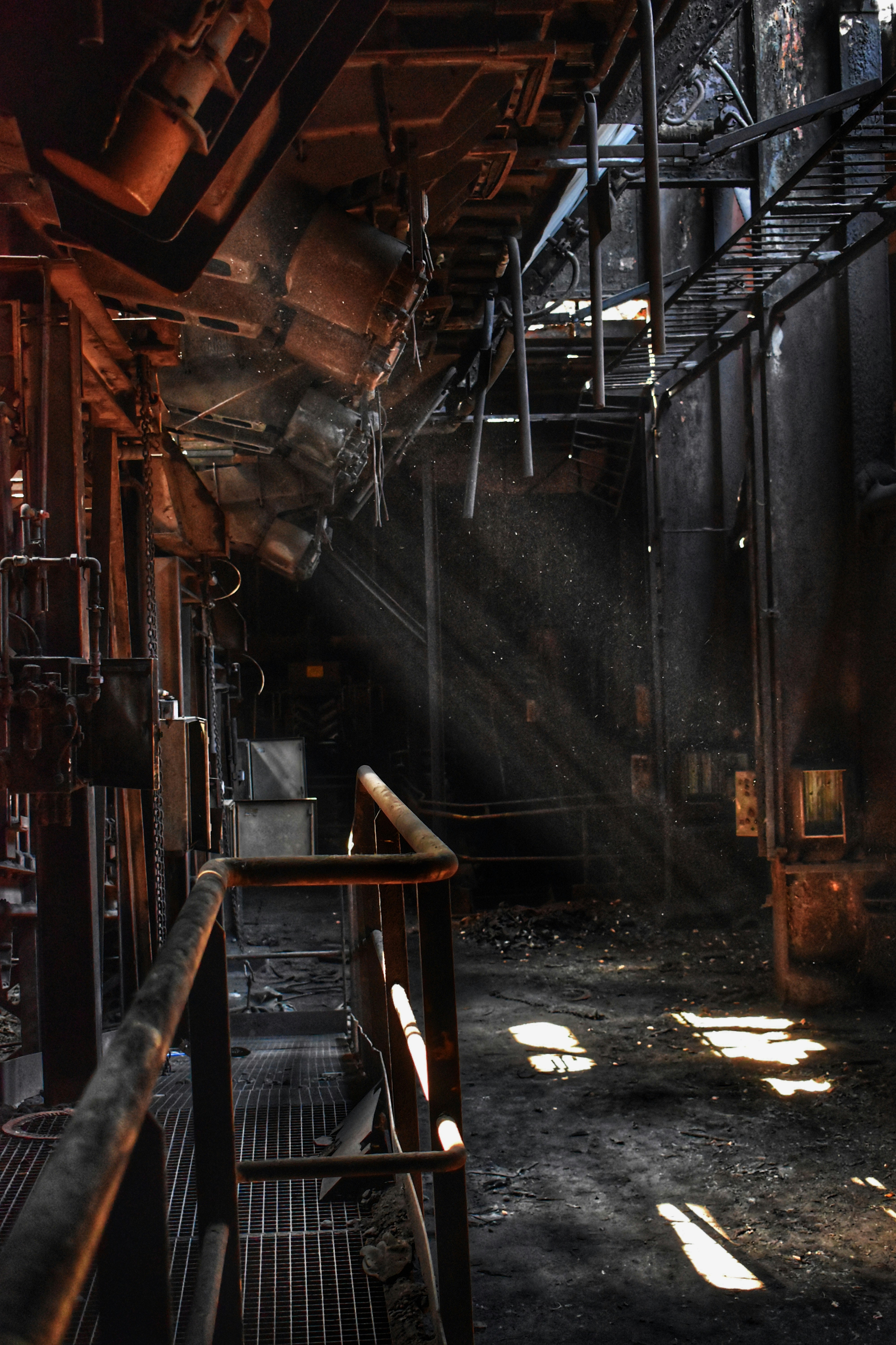 Dim Corridor of Steel: A Ray of Light on the Industrial Interior