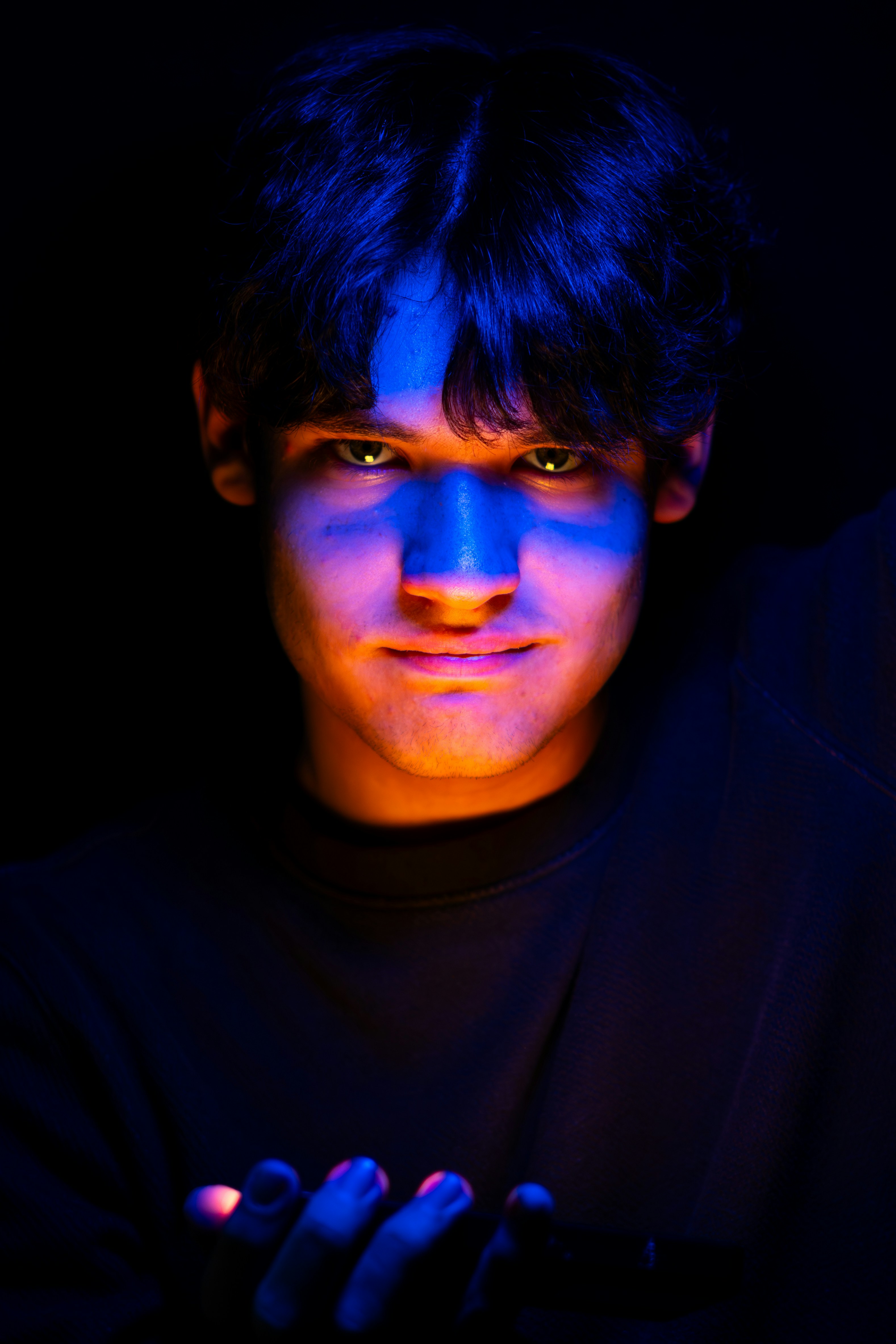 Under Neon Gaze: Cyan-Amber Portrait