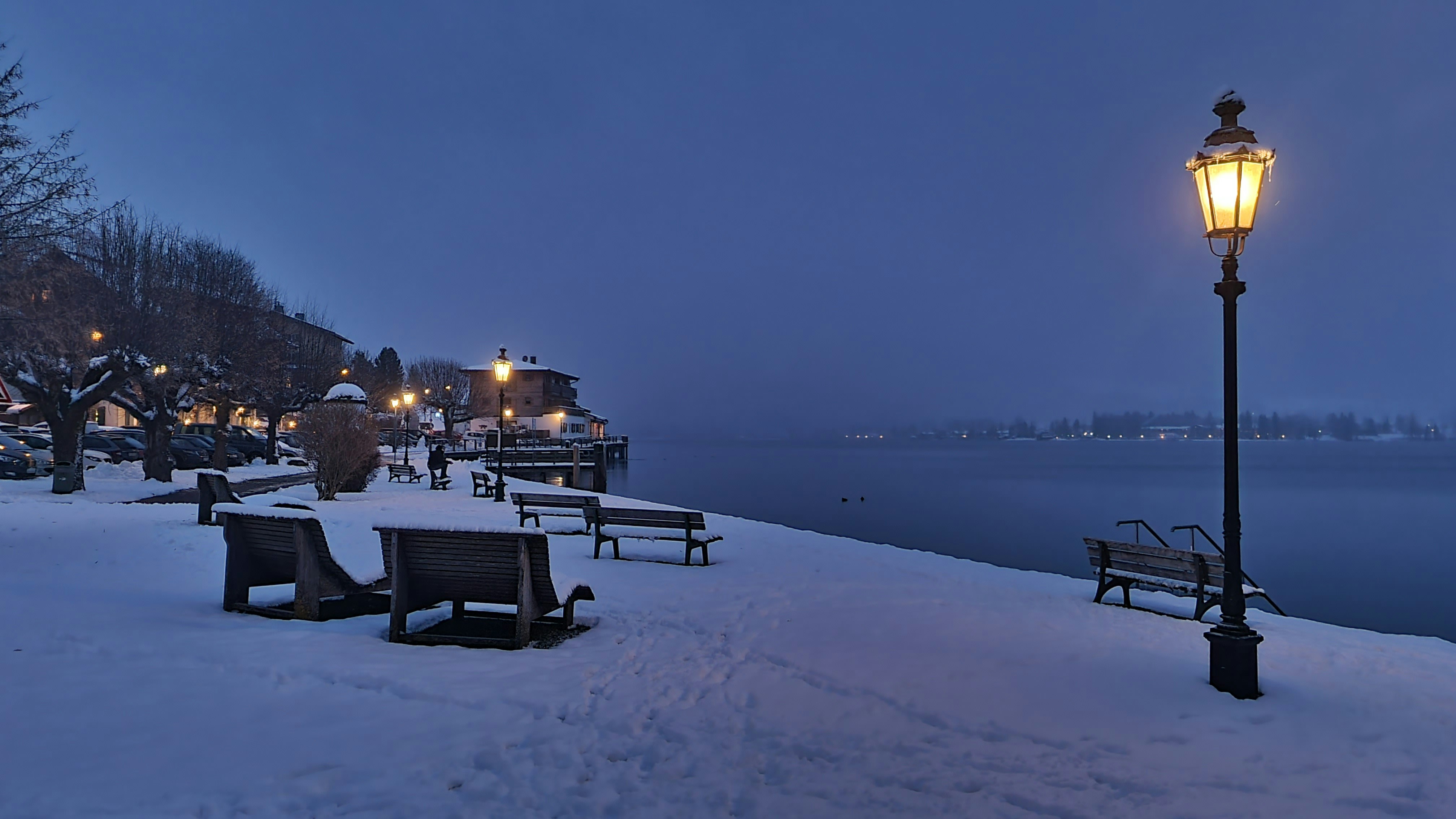 Lone Lantern on a Snowbound Lakeside at Blue Hour