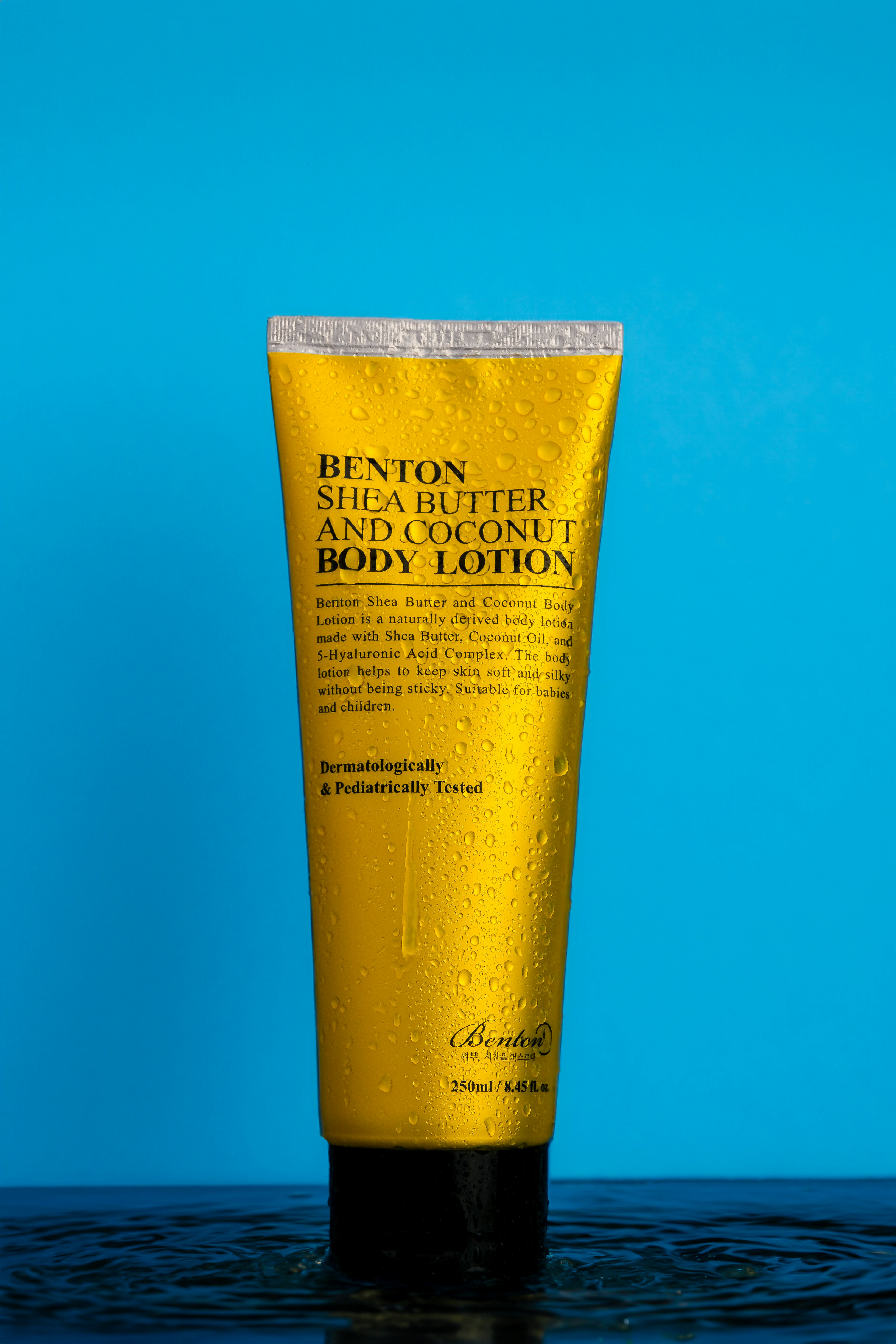 A tube of body lotion sitting on top of a table photo – Free Beer Image ...