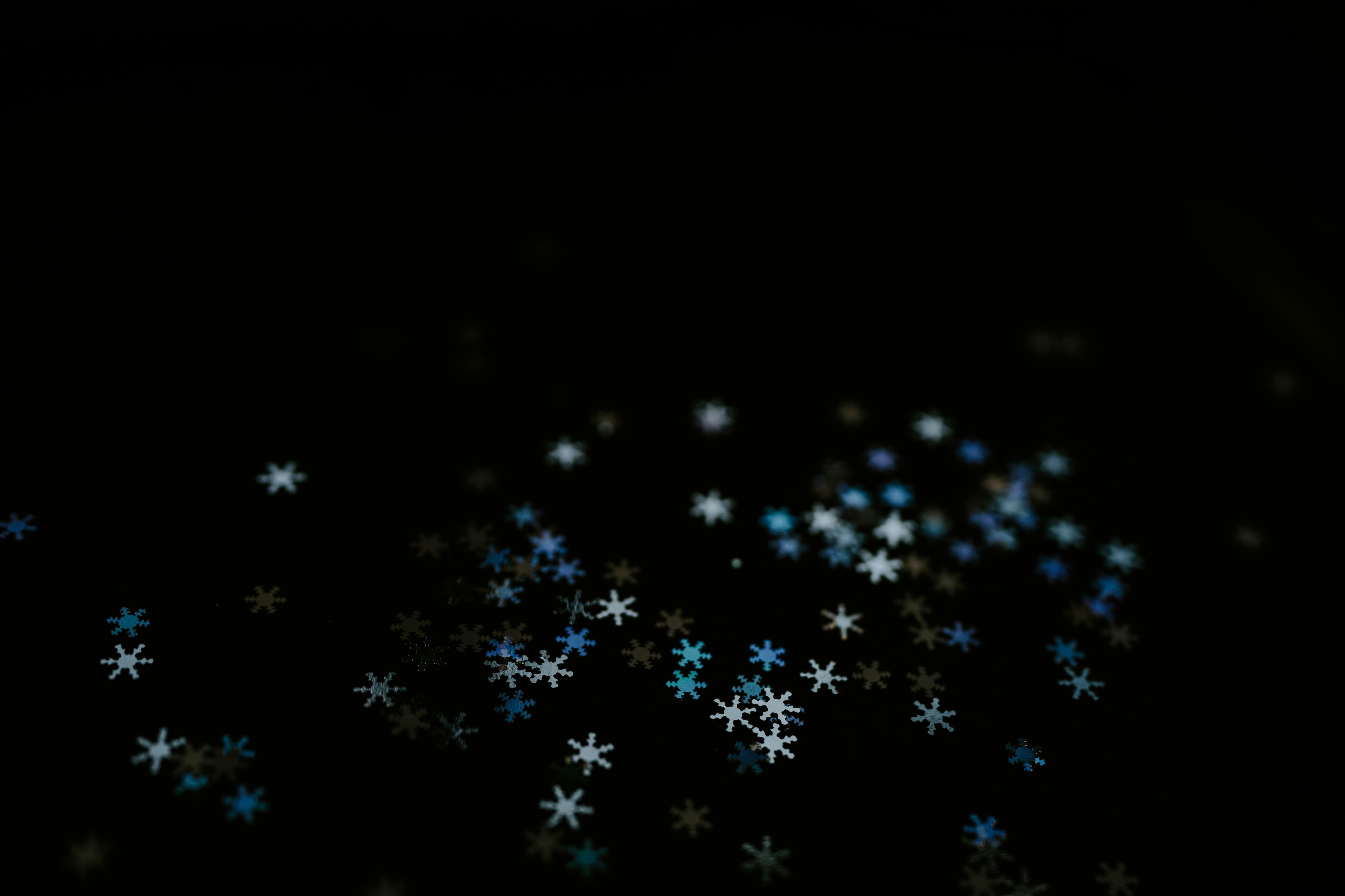 A black background with a lot of snow flakes photo – Free Snowflake ...