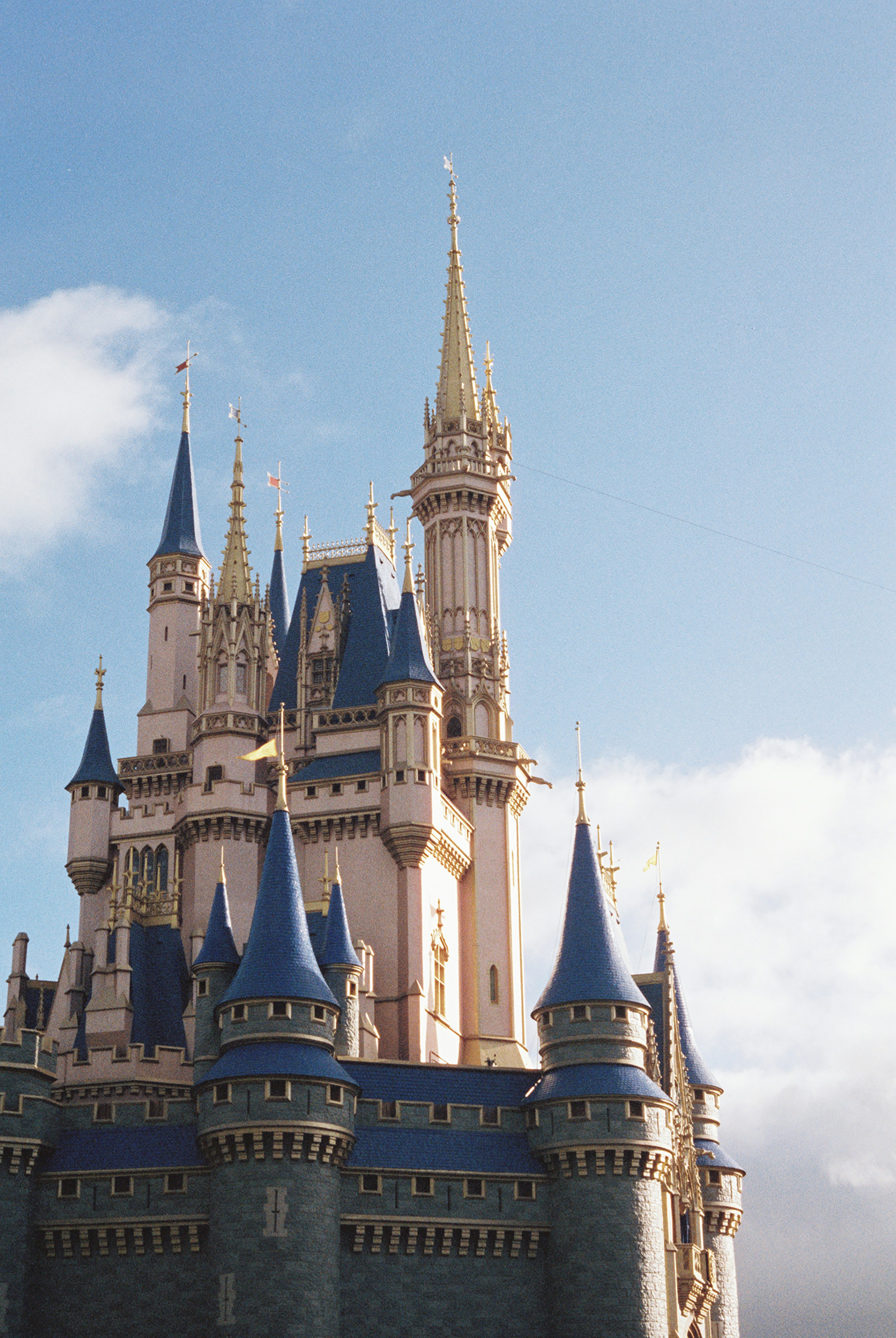 A very tall castle with a clock on it's side photo – Free Usa Image on ...
