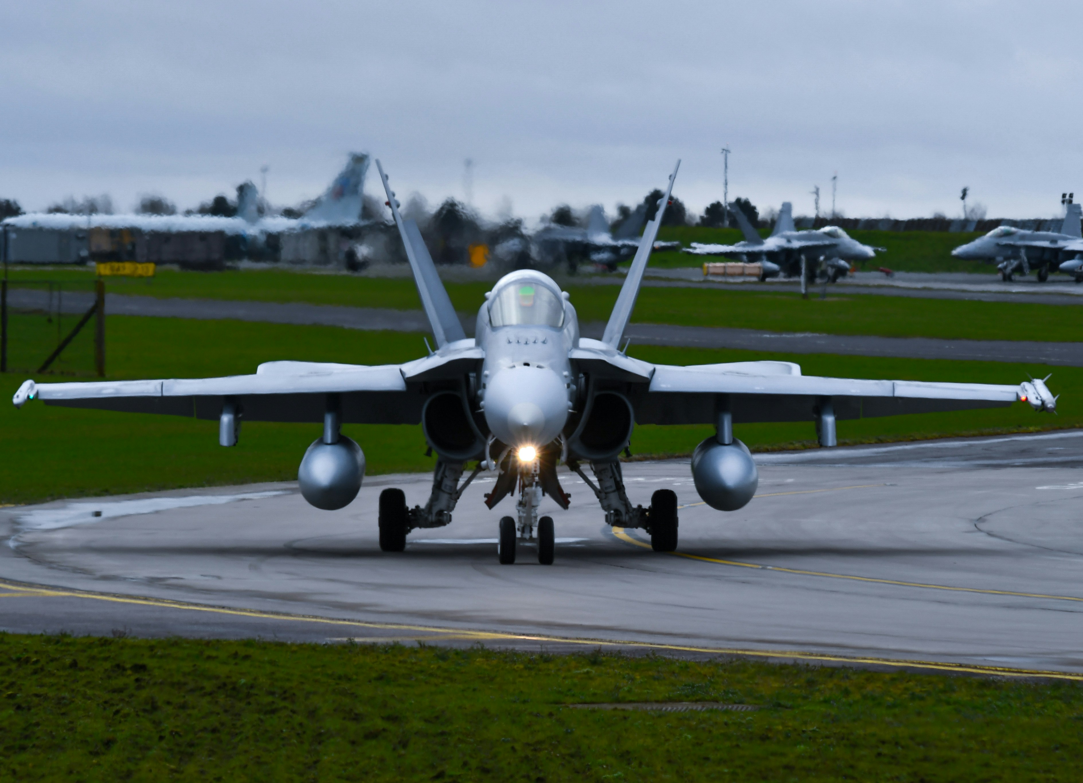 A fighter jet taking off from an airport runway photo – Free Raf ...