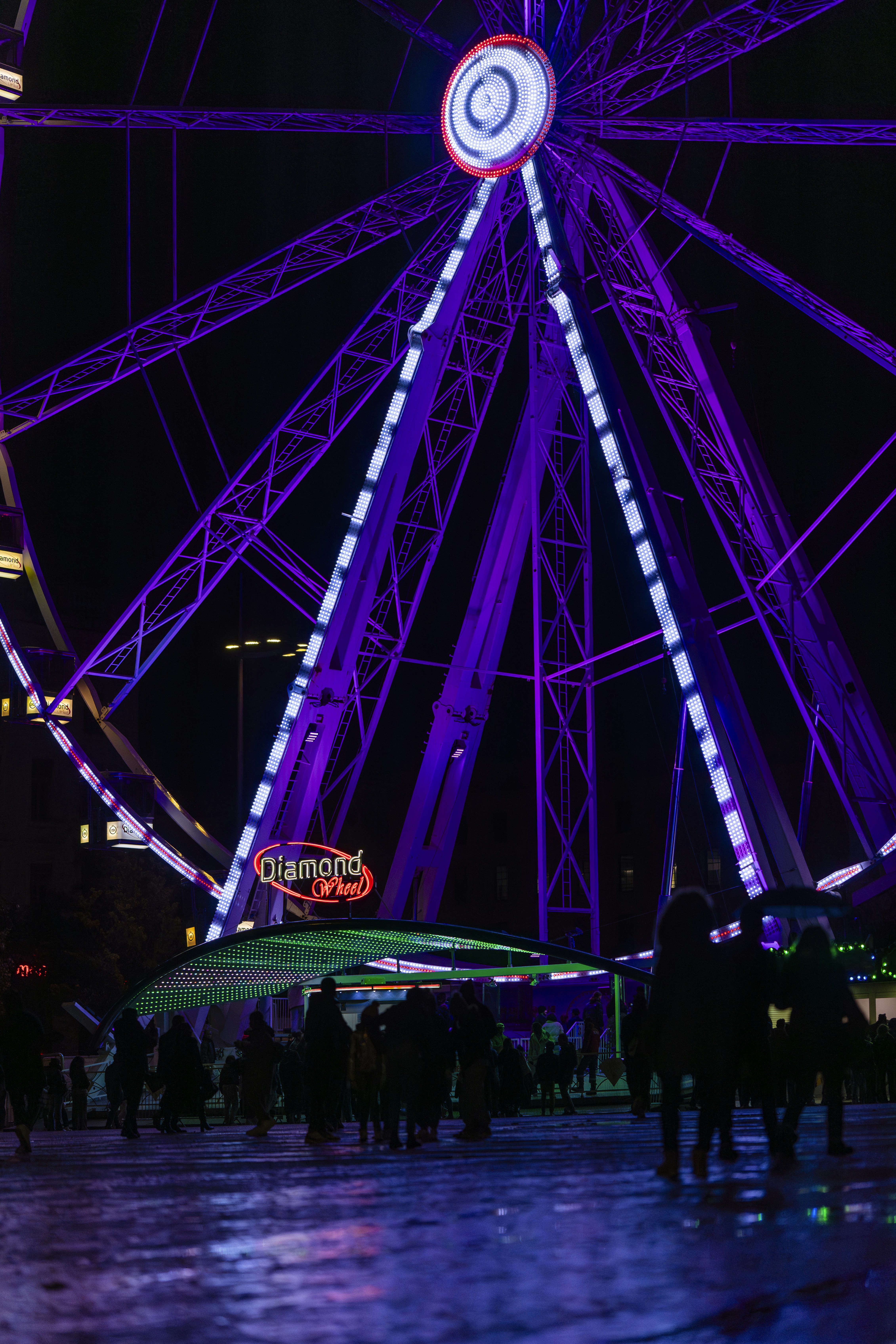 Midnight Pulse: Purple Ferris Wheel Over the Diamond Plaza