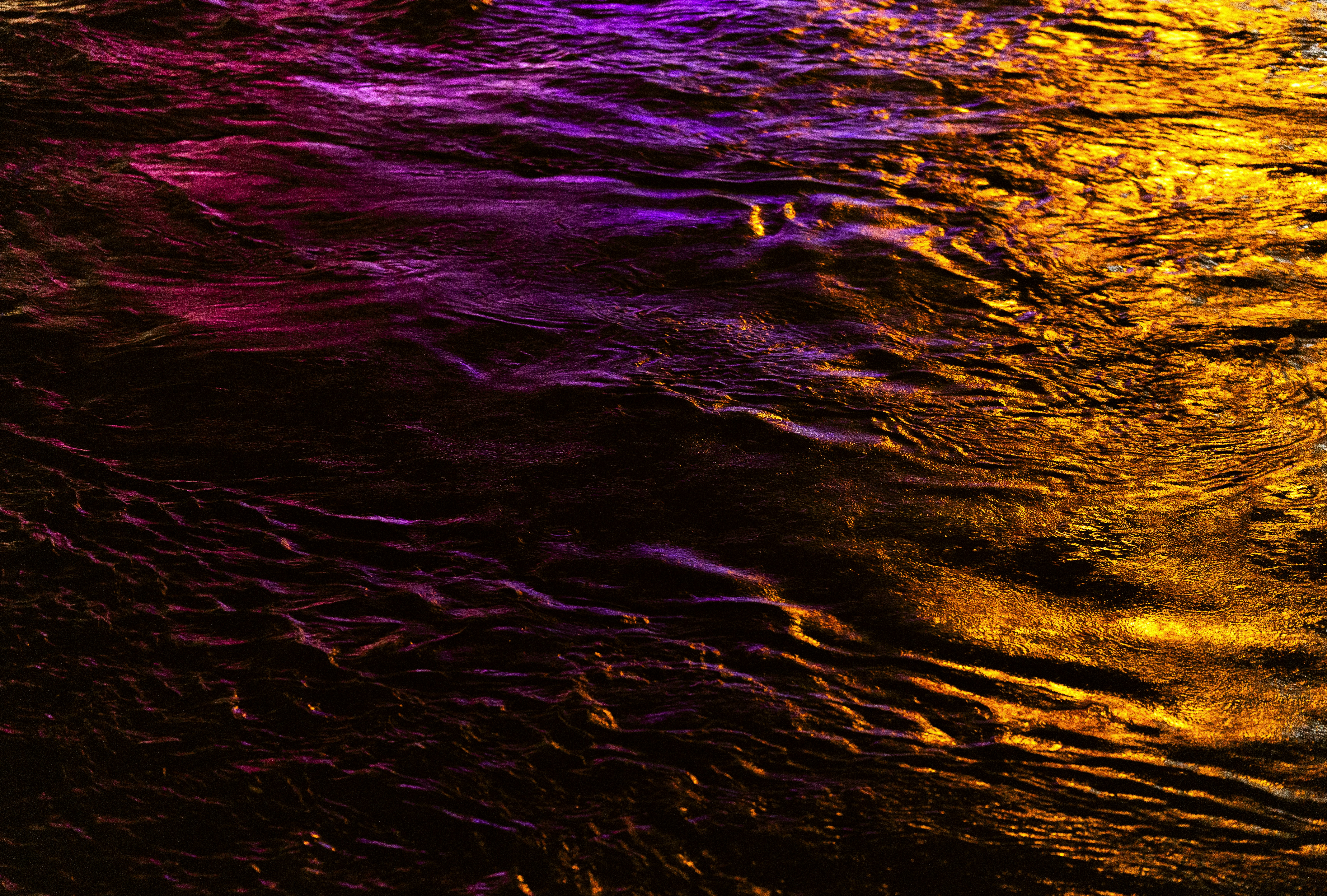 Gilded Ripples Across Twilight Water
