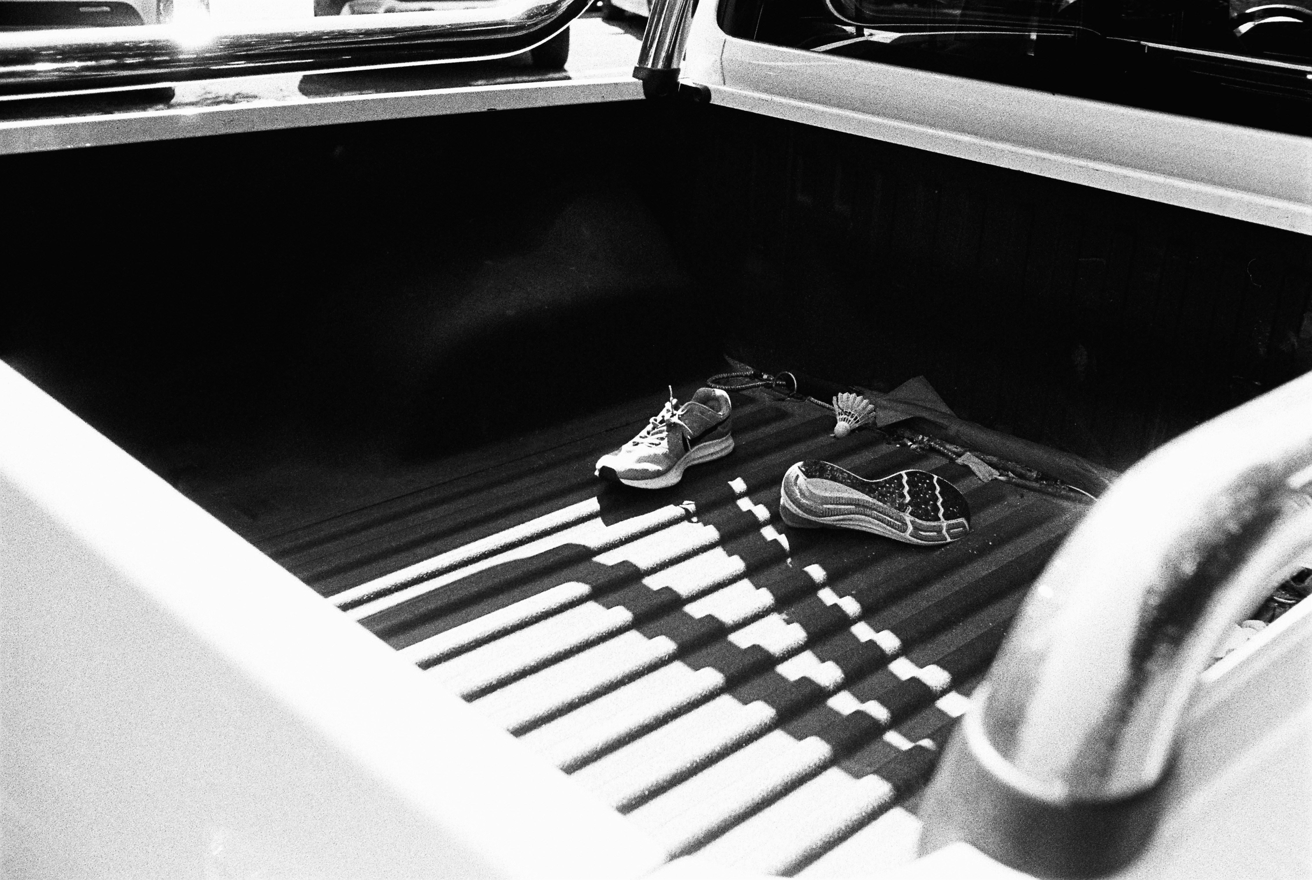 A pair of shoes sitting in the back of a truck photo – Free Milano ...
