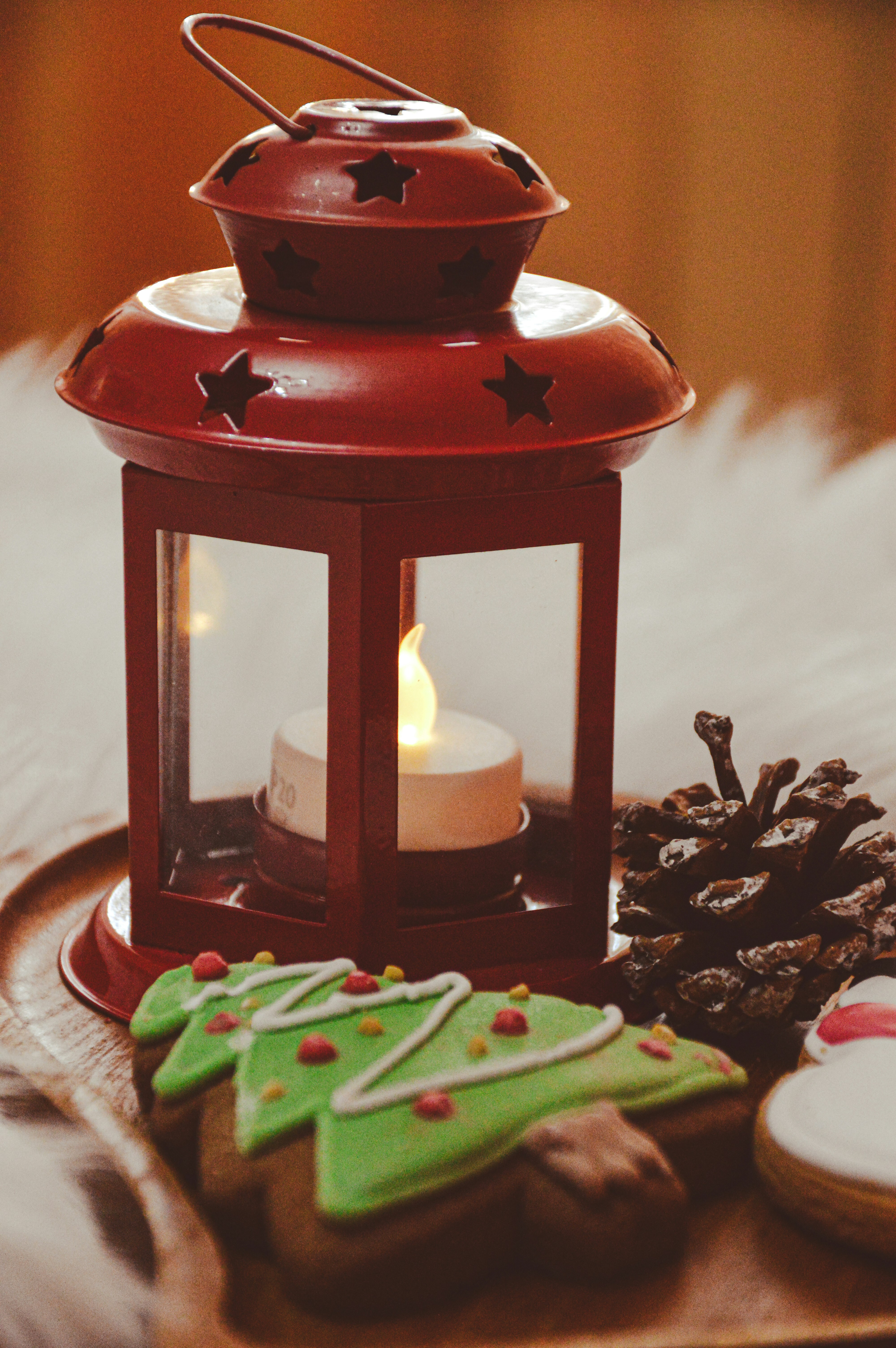 Lantern Glow Amid Festive Treats: Cozy Christmas Still Life