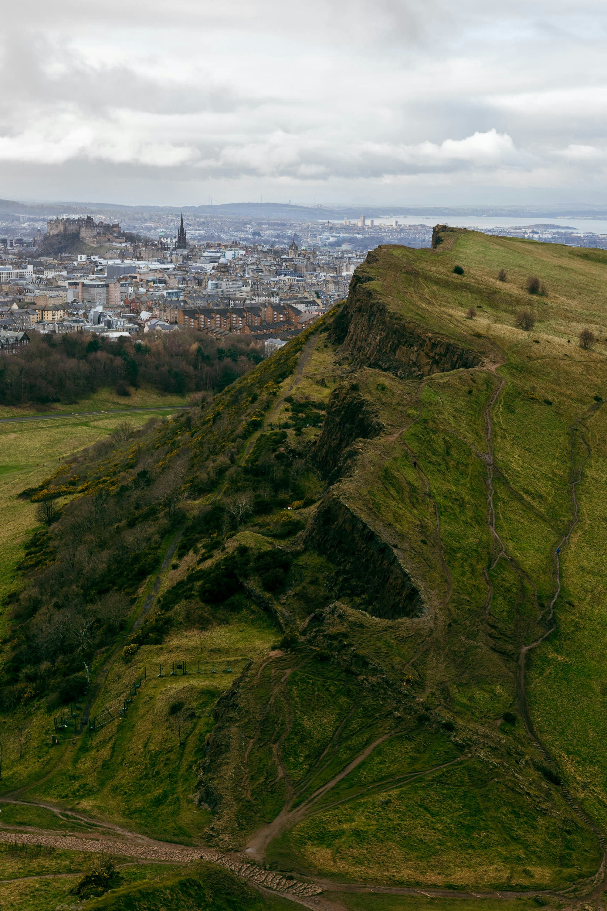 A view of a city from the top of a hill photo – Free Arthur's seat ...