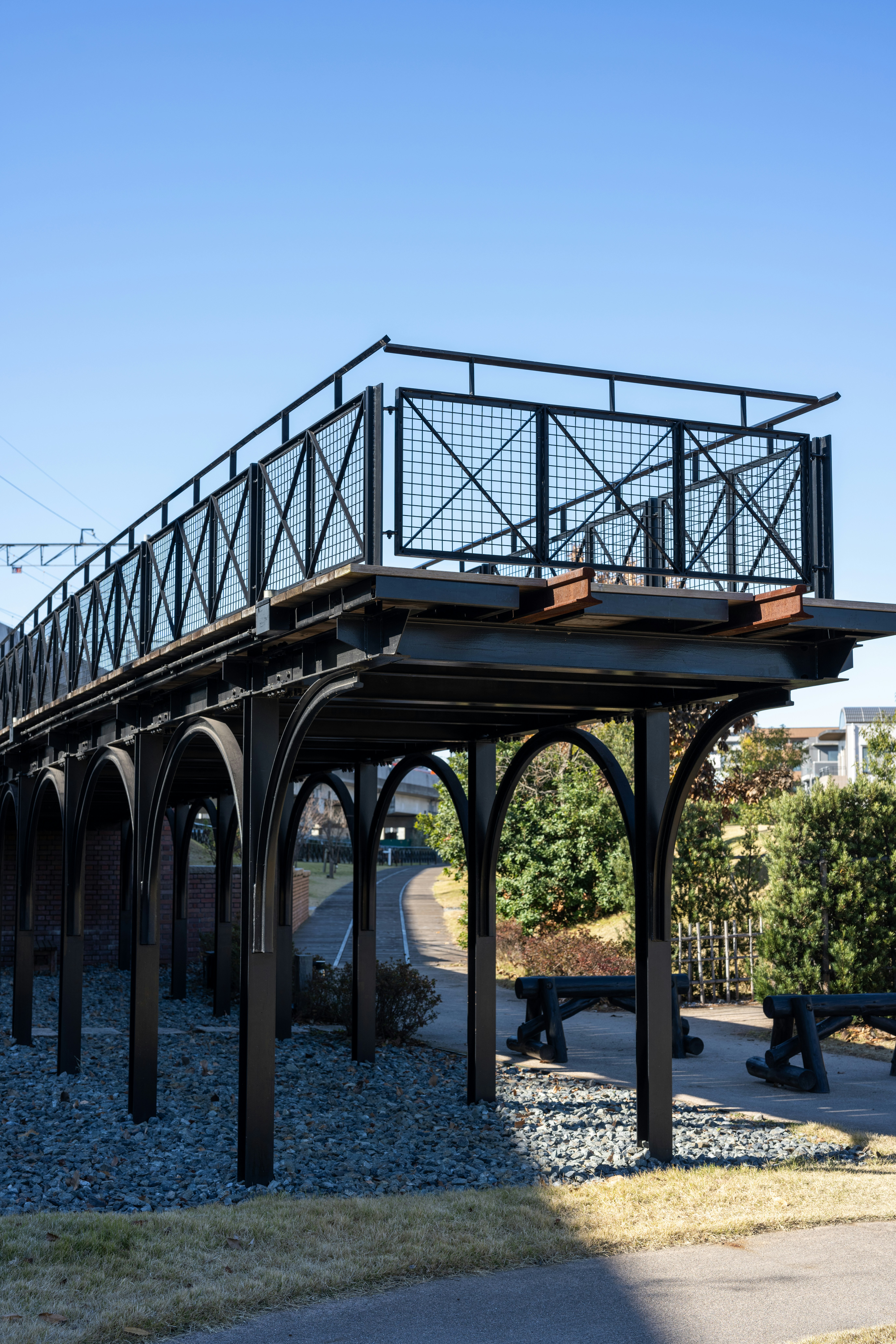 A bridge with a metal railing on top of it photo – Free City Image on ...