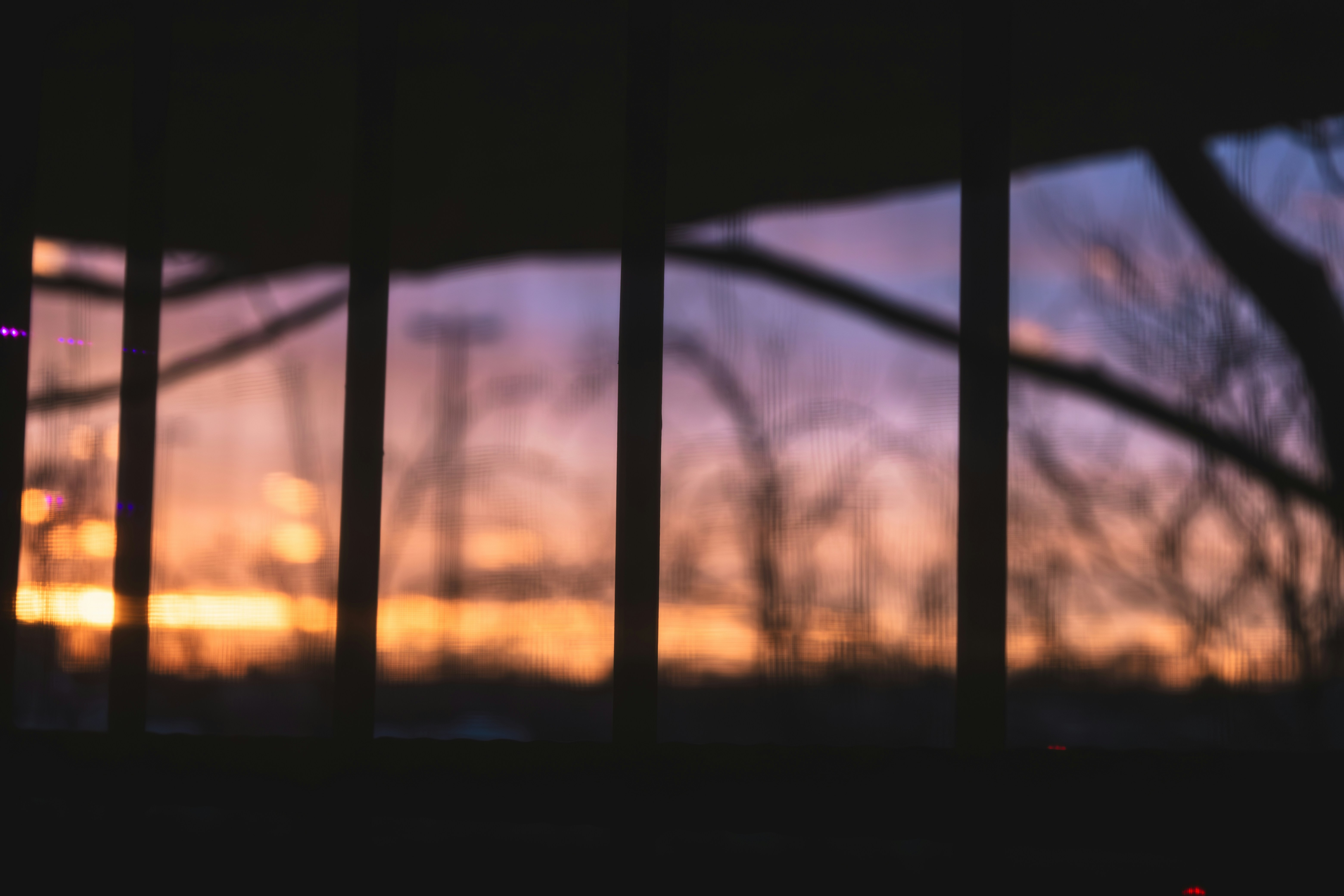 A view of a sunset through a window photo – Free Nature Image on Unsplash