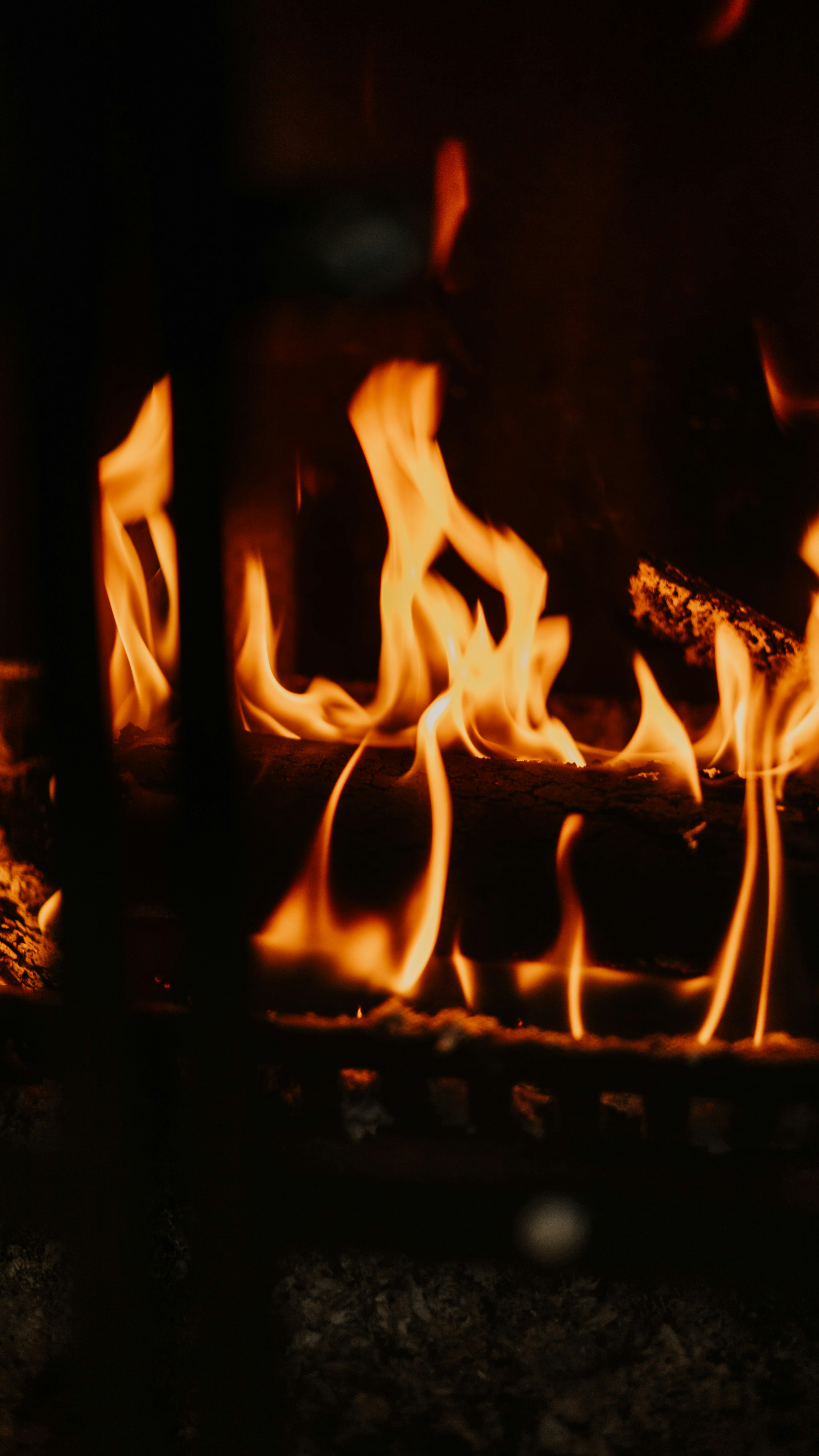 A close up of a fire burning in a fireplace photo – Free Fire Image on ...