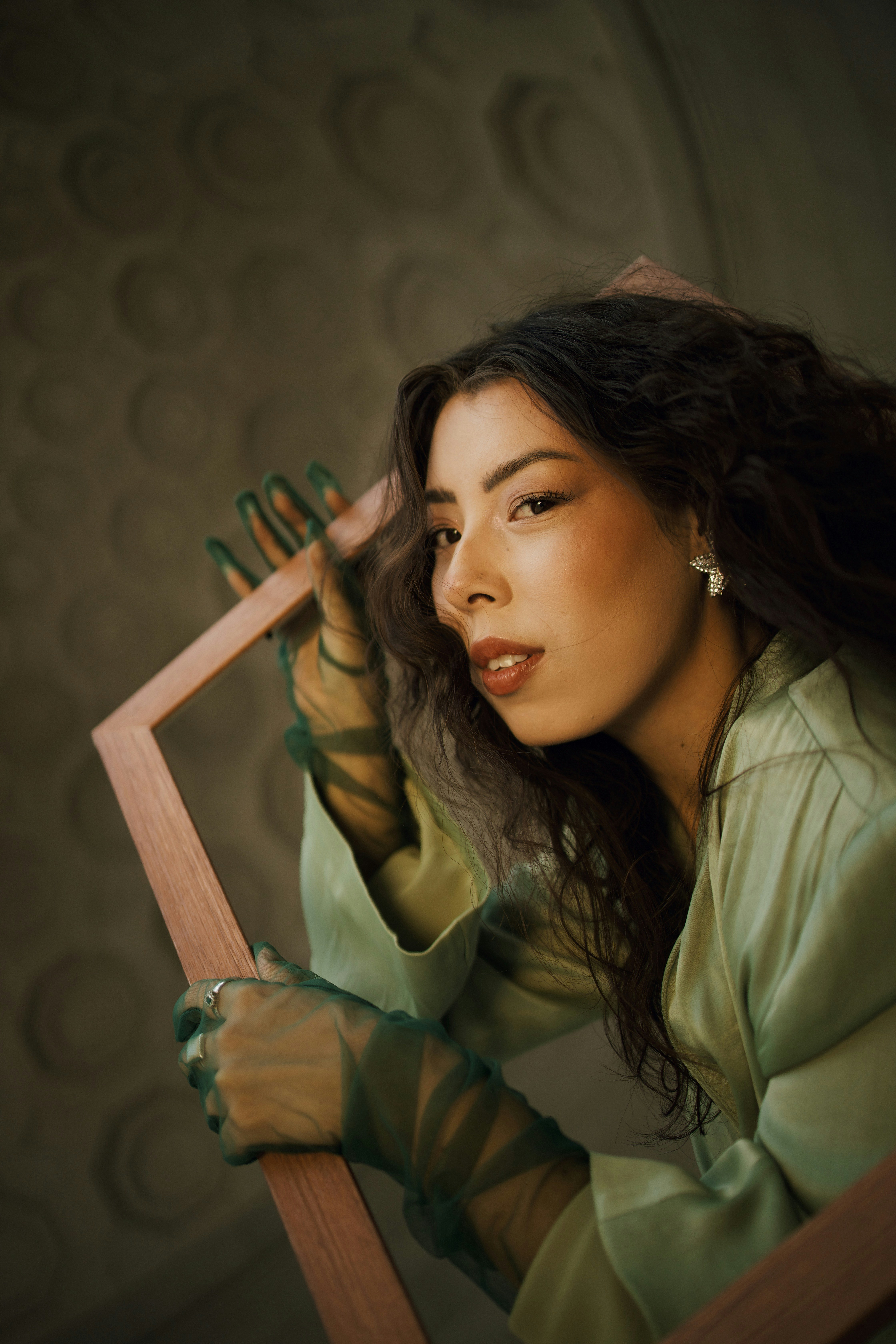 Through the Frame: Green Silk and Warm Glow