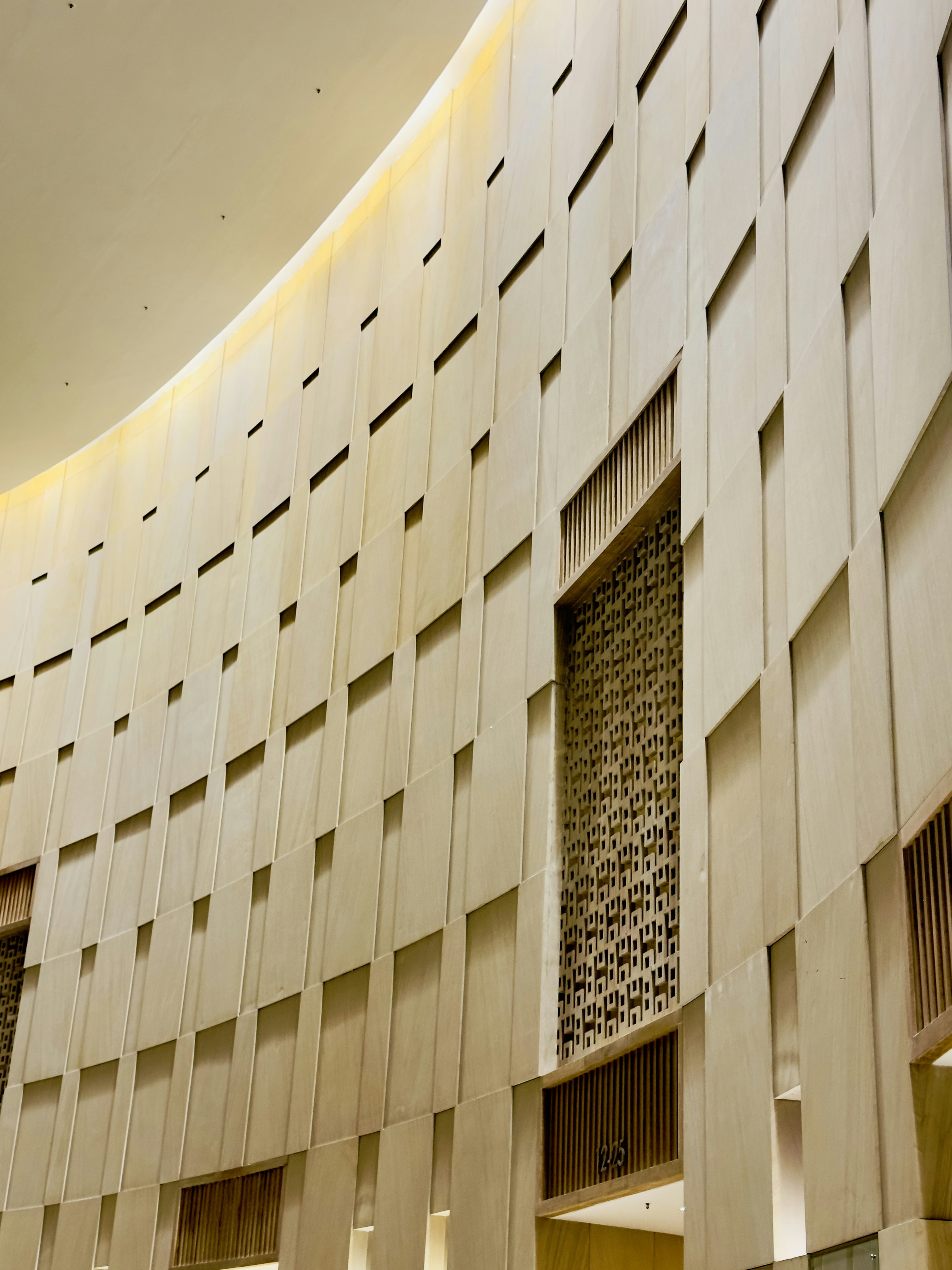 Curved Facade of Modern Architecture with Grid Windows