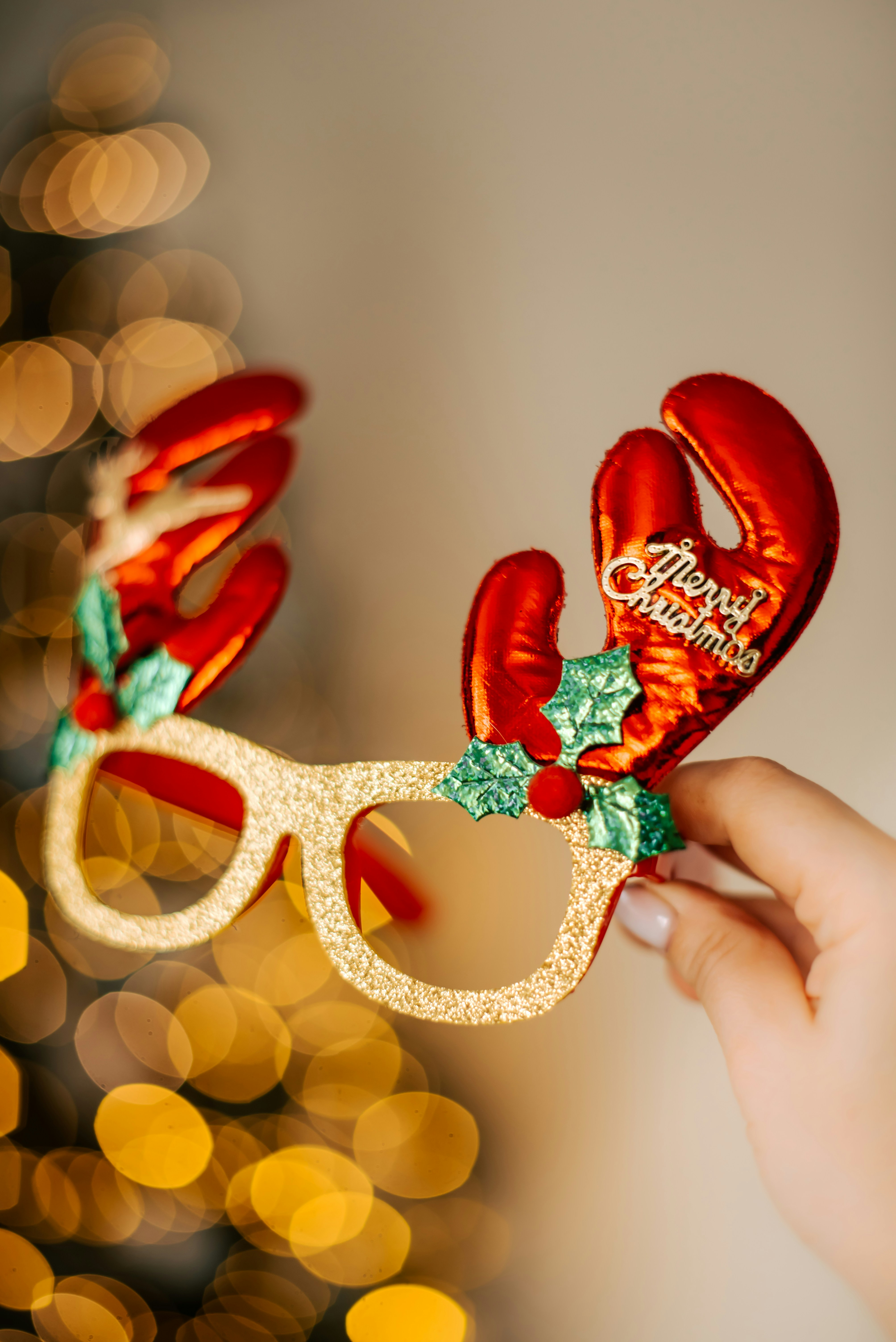 Merry Antlers in Golden Glow: Handheld Christmas Glasses