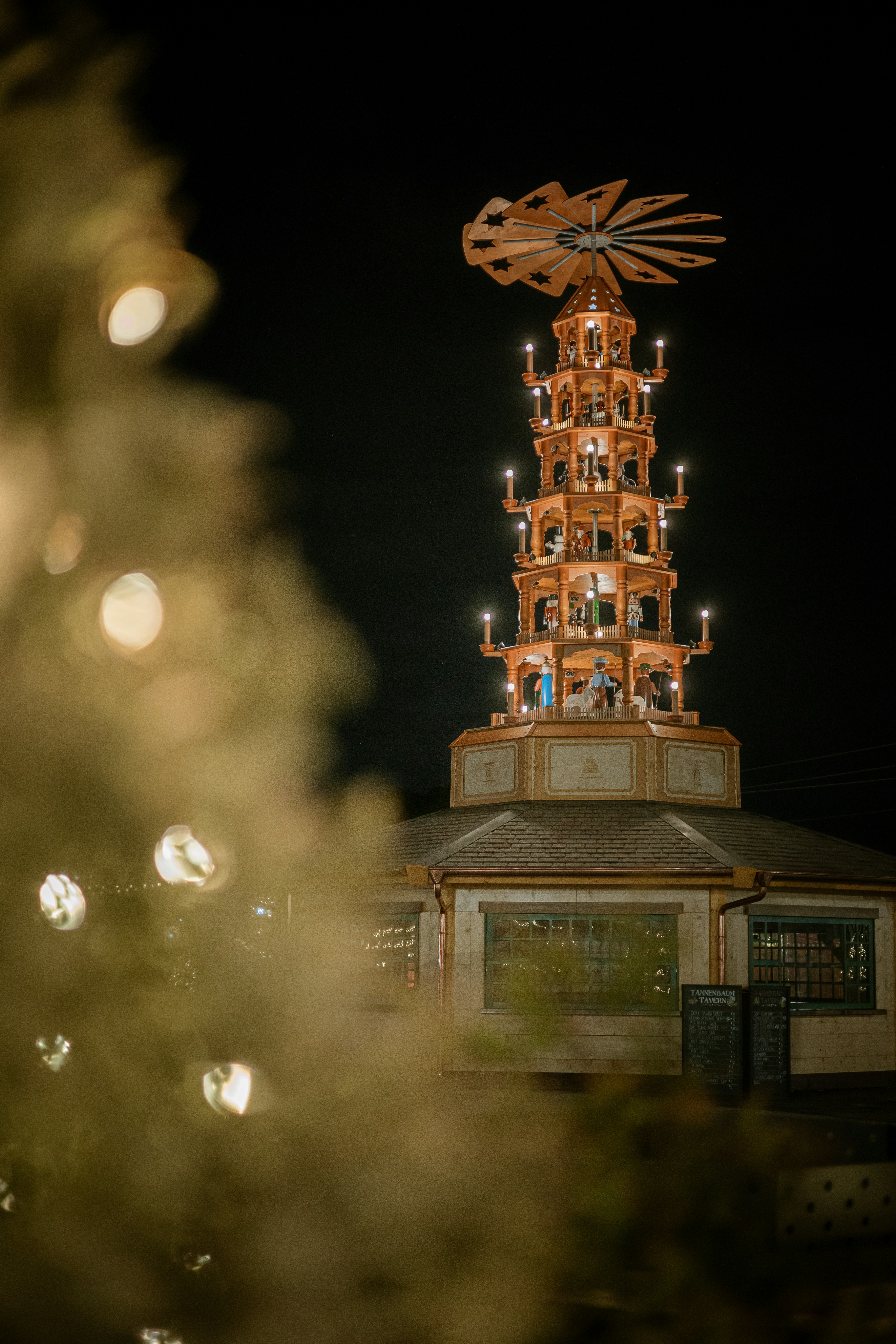 Night Shrine: A Candlelit Pagoda Rising Above the Quiet Plaza