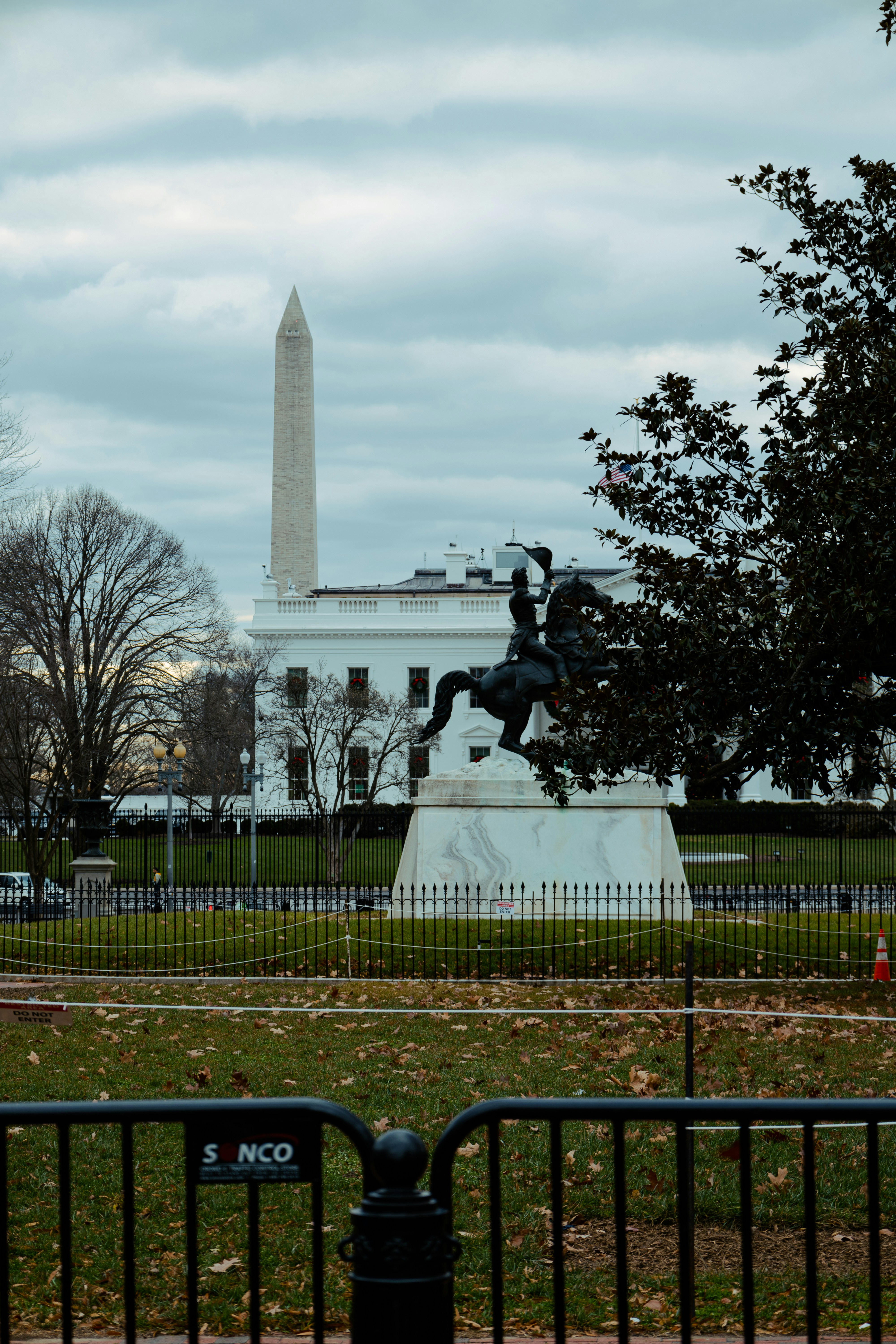 Washington Monument, Equestrian Statue, and White House Complex Form in Distant Park Scene